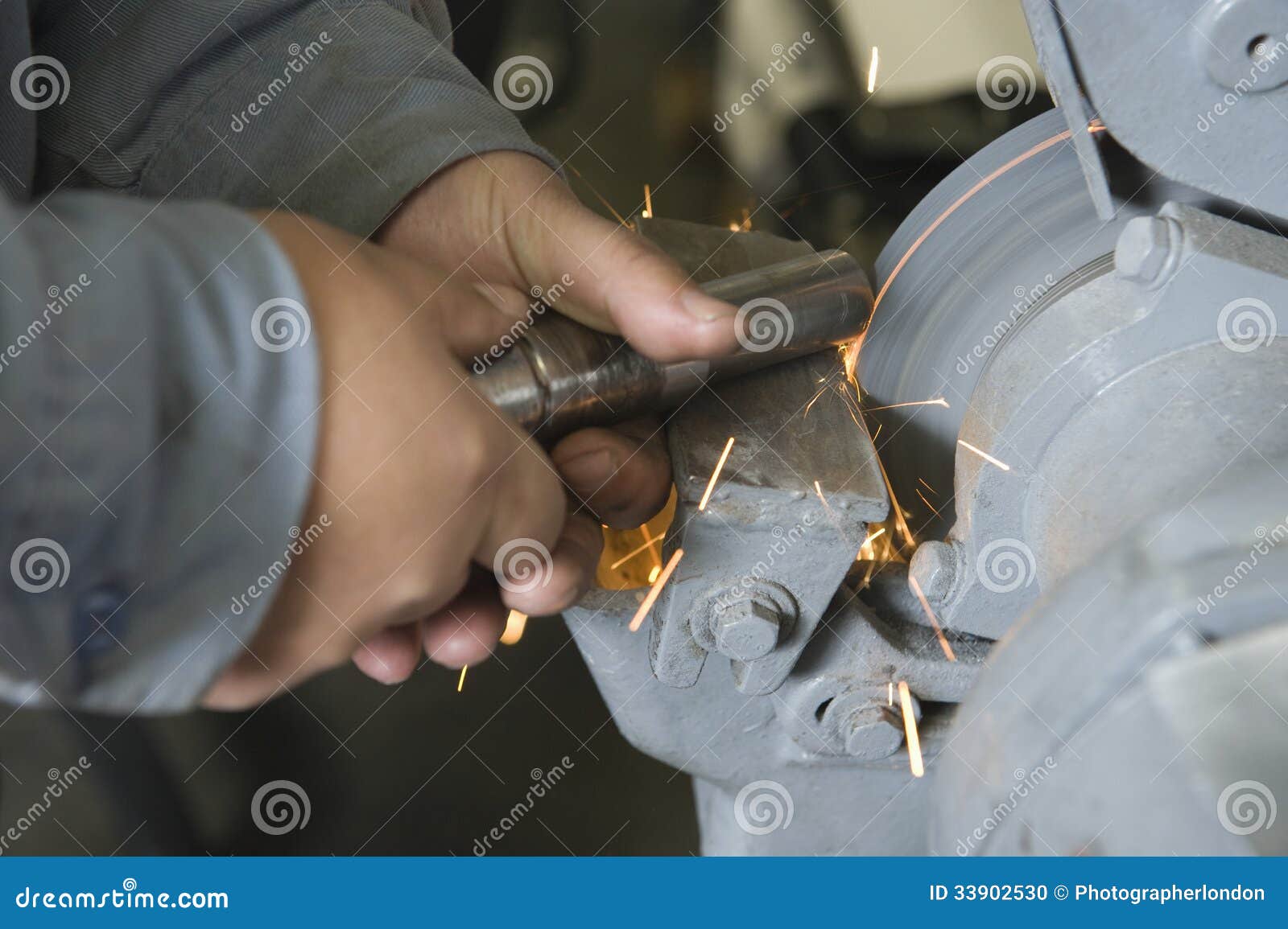 Sparks while Grinding Metal Stock Photo - Image of focus, grinder: 33902530