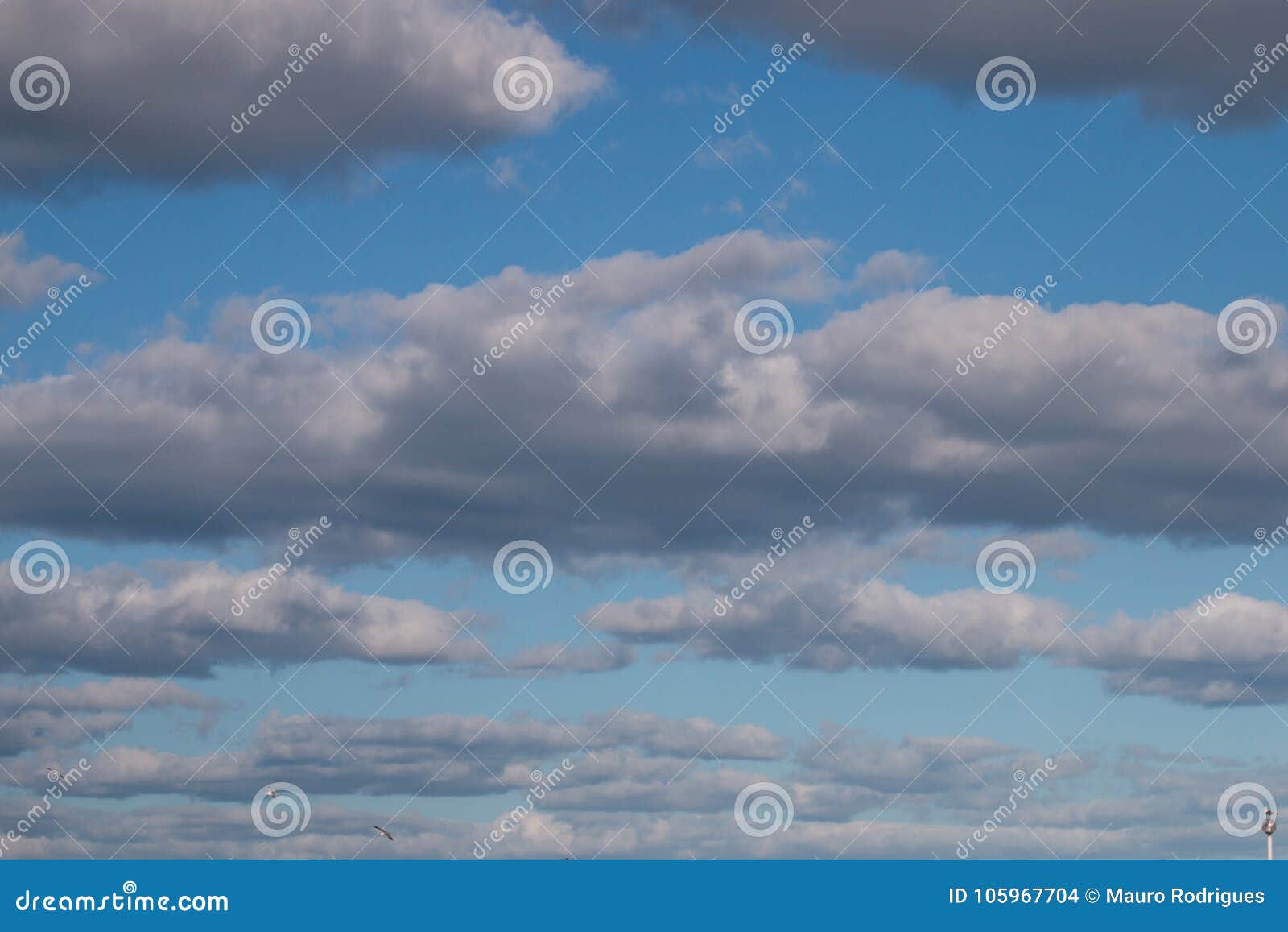 Sparse cloudy gray clouds stock photo. Image of stormy - 105967704