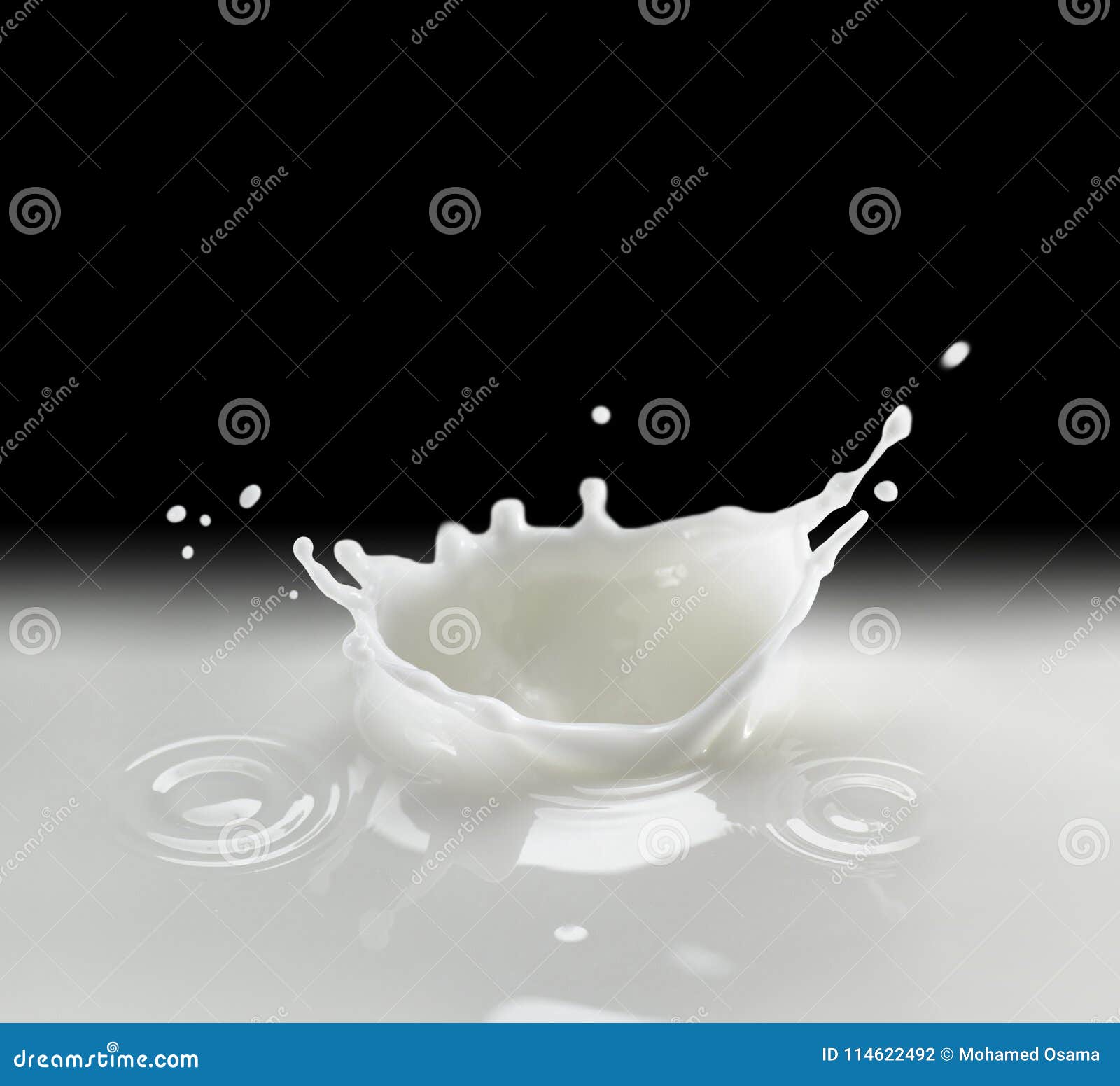Spash of Milk on Black stock photo. Image of flowing - 114622492