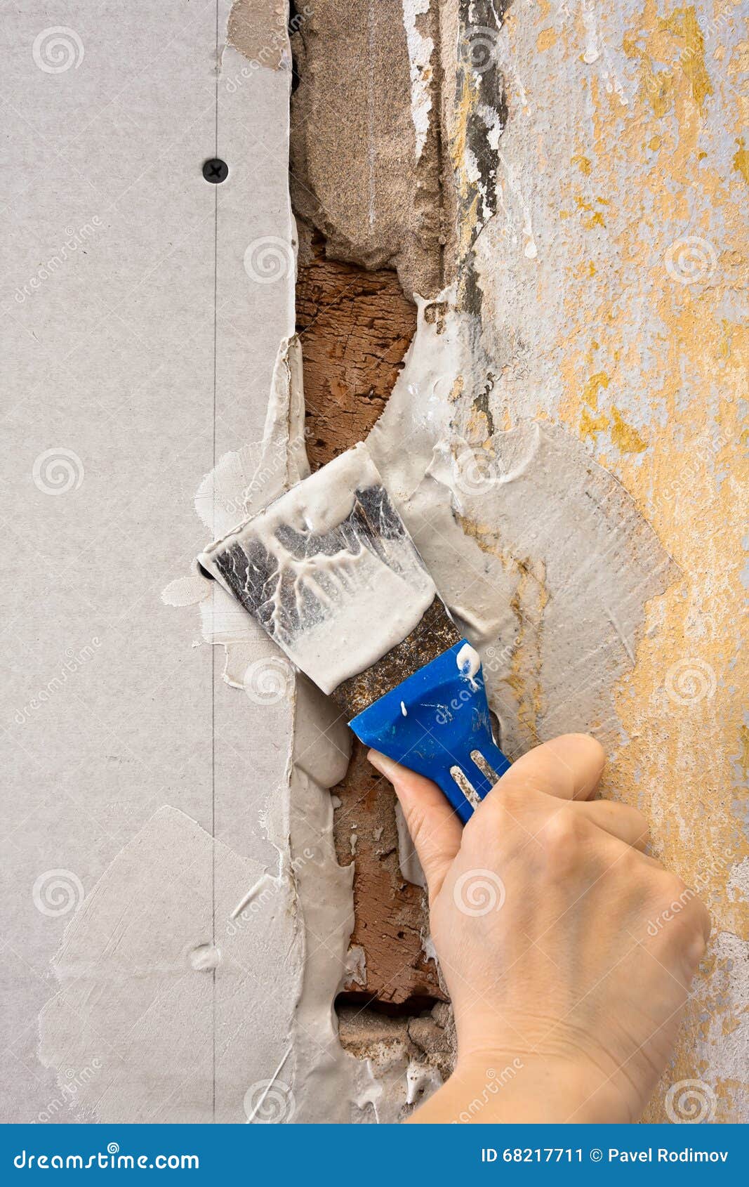 Spatula with Plaster in Hand during Repair Stock Image - Image of ...