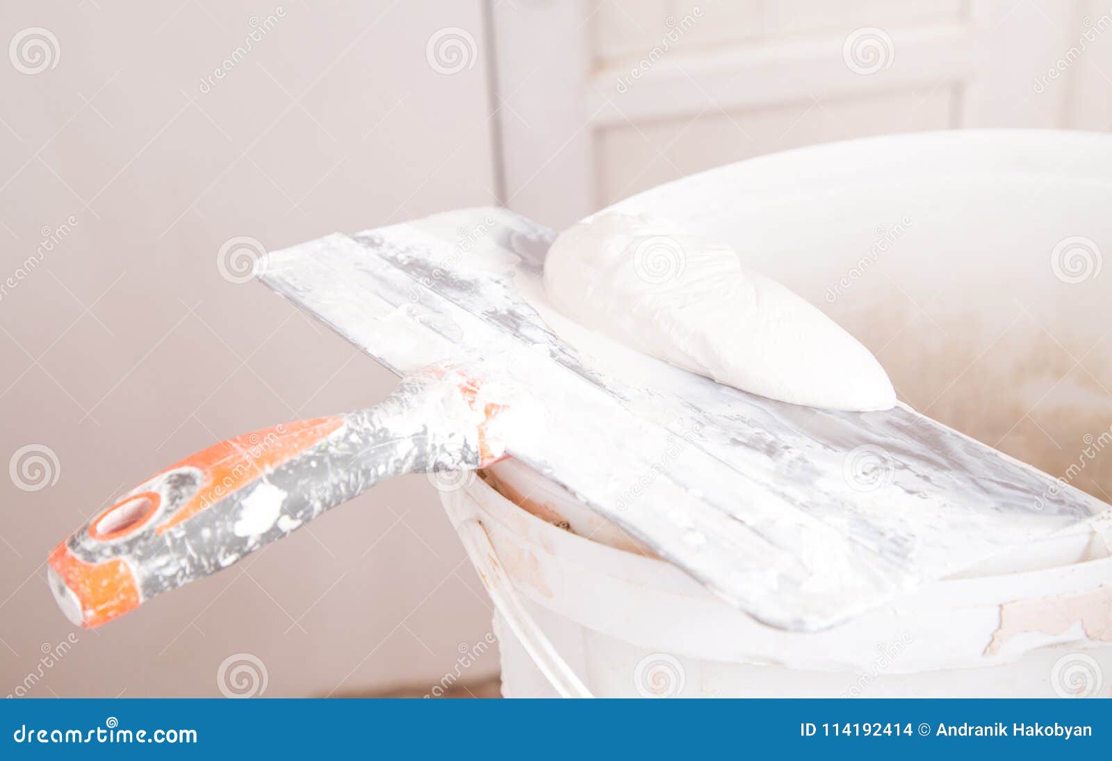 Spatula with putty. stock photo. Image of preparation - 114192414