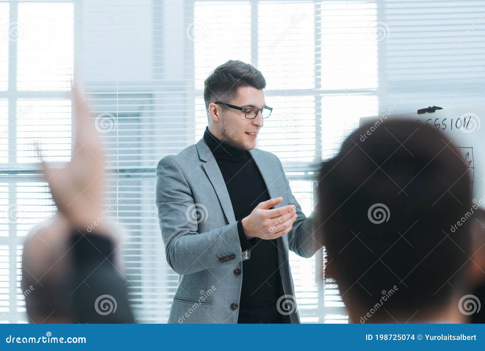 Speaker Asking Questions during a Business Presentation. Stock Photo ...