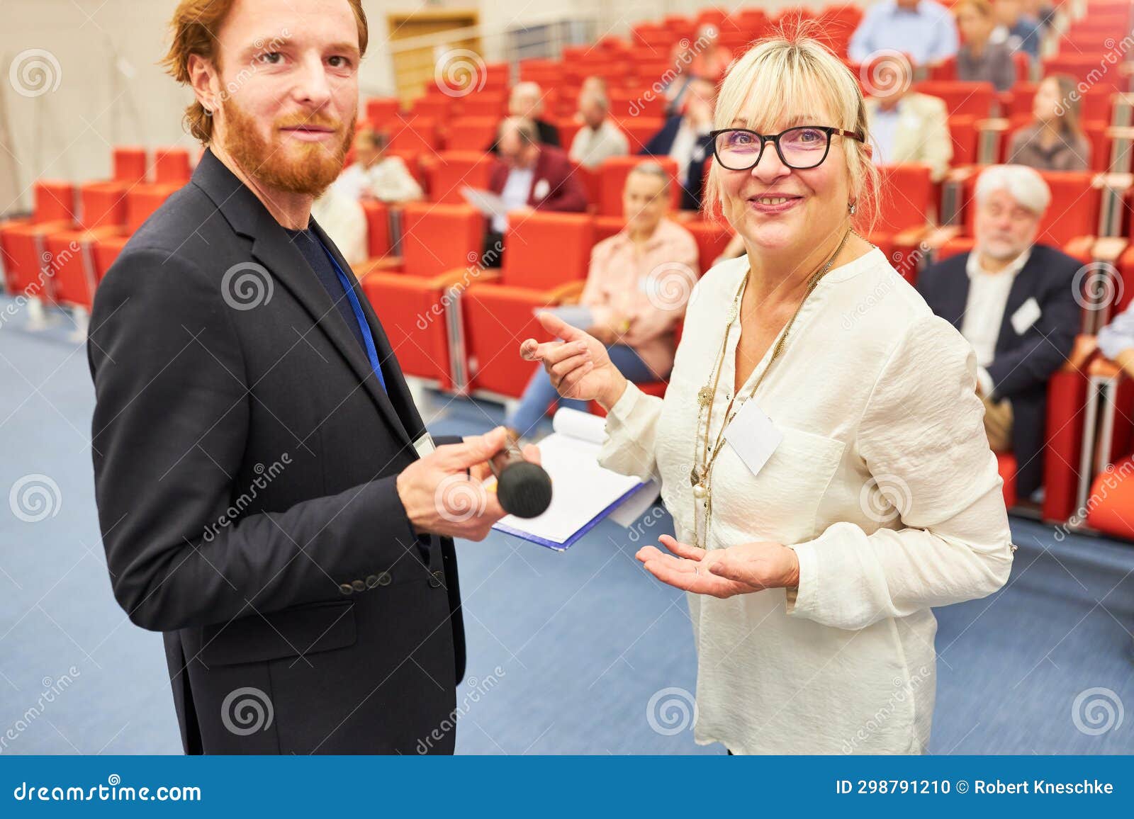 Speaker Engaging with Audience during Interactive Seminar Event Stock ...