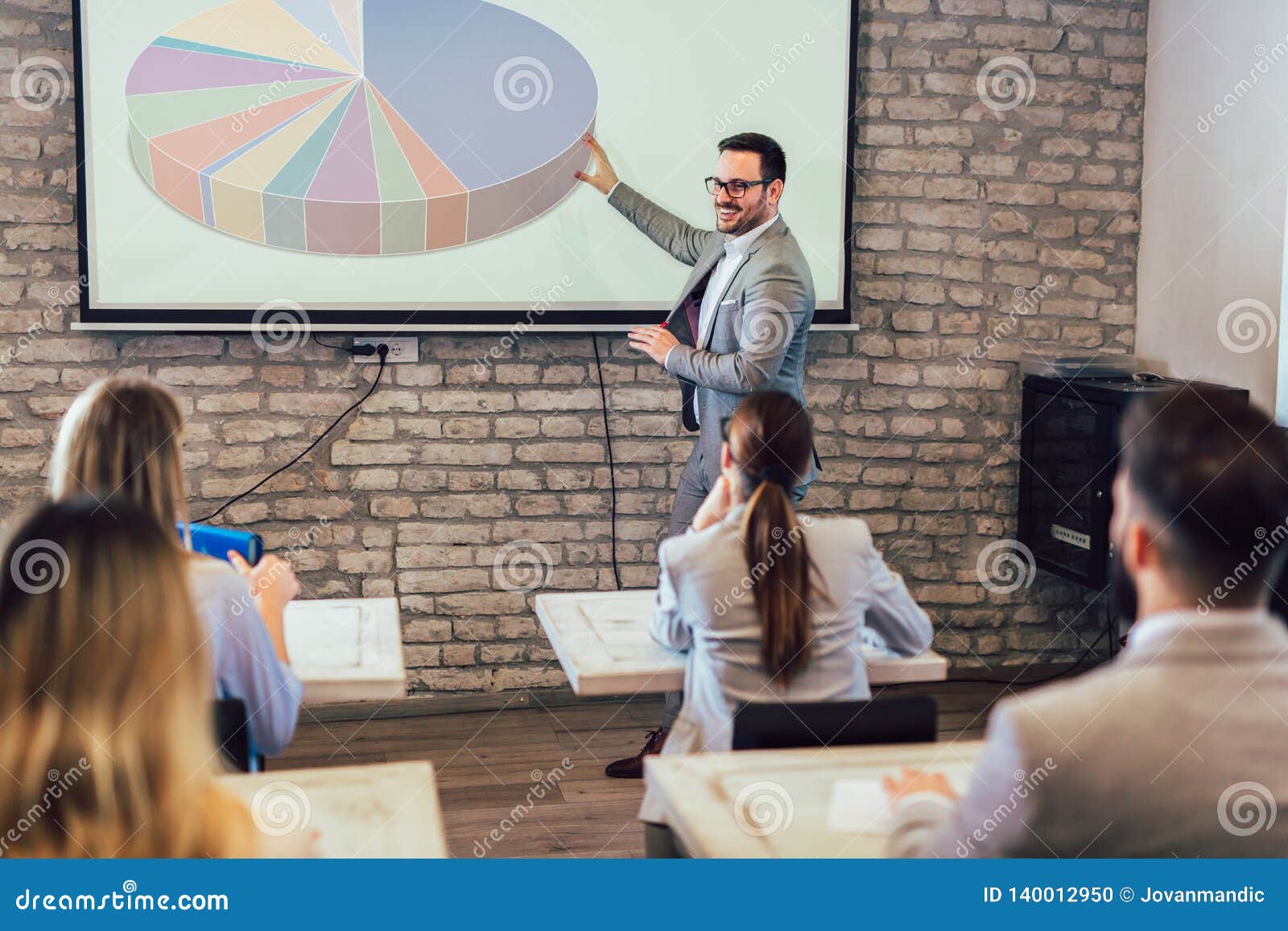 Speaker Giving Public Presentation Using Projector in Conference Room ...