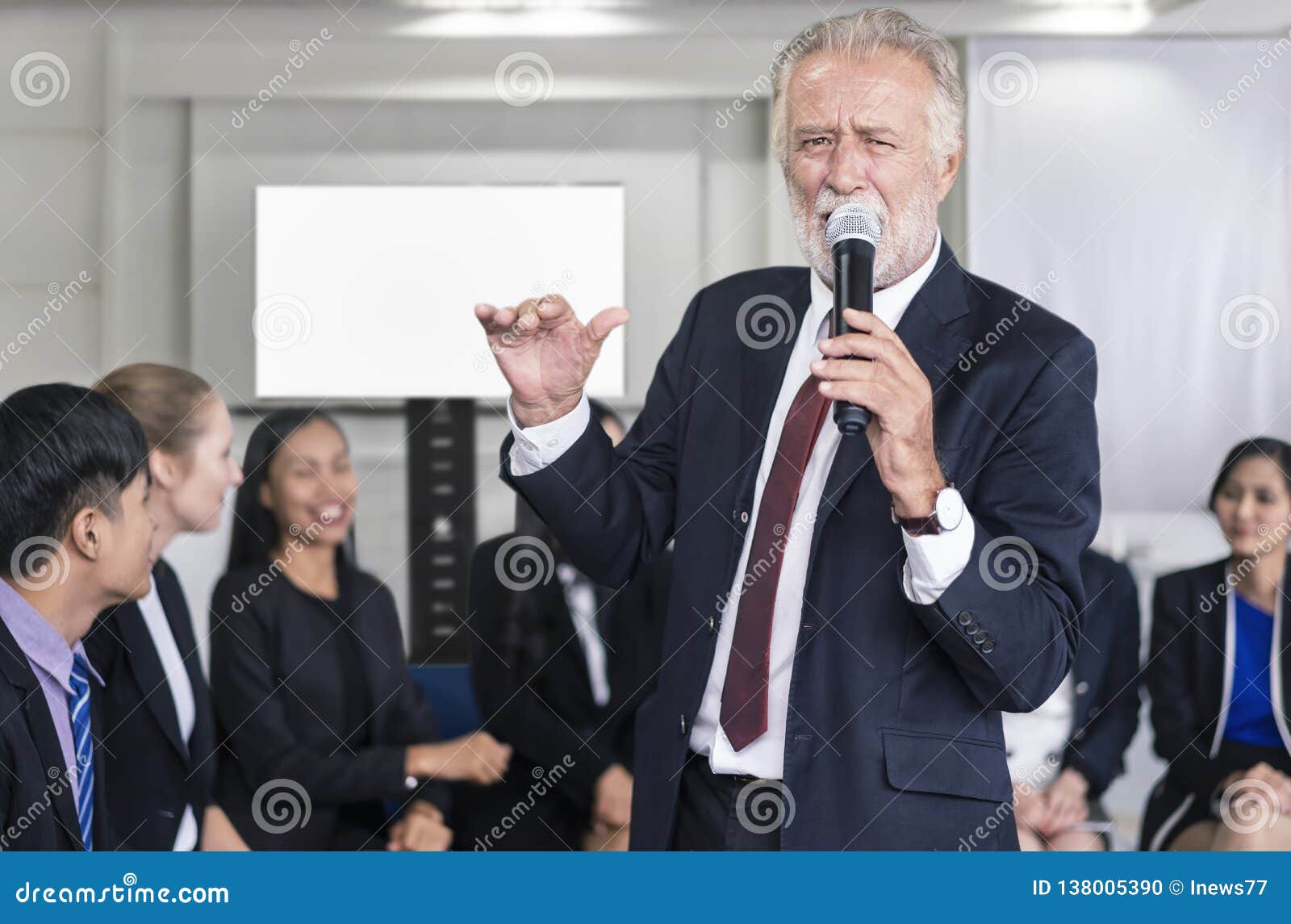 Speaker Giving a Talk on Corporate Business Conference. Business ... Speaker Giving a Talk on Corporate Business Conference. Business ...