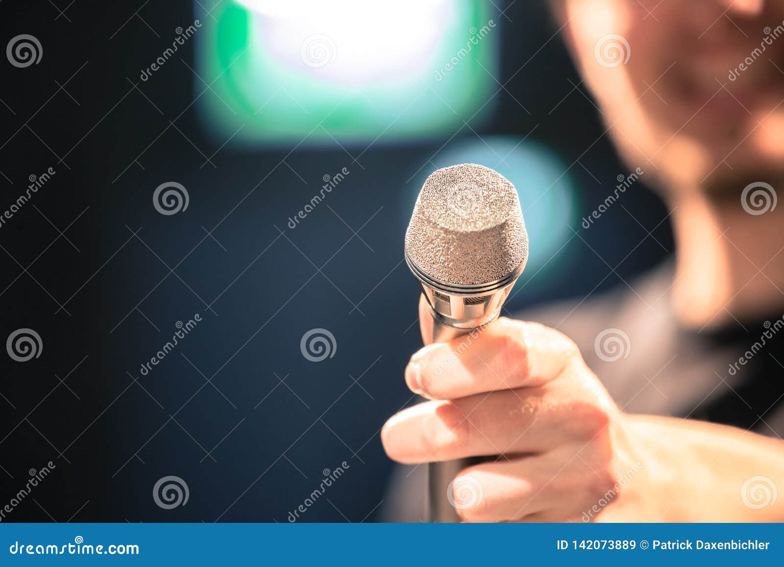 Speaker on the Stage: Young Caucasian Man is Talking into a Mirophone ...