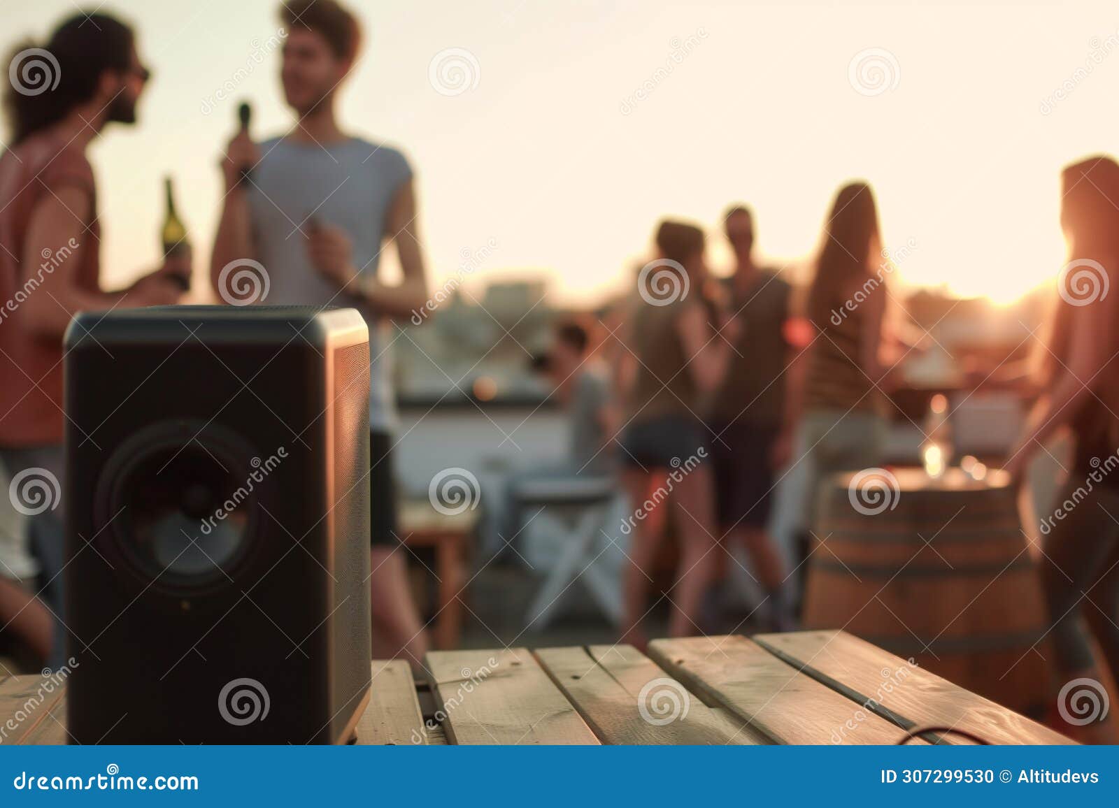 Speaker on Table, Blurry Young People Grooving at a Rooftop Party Stock ...