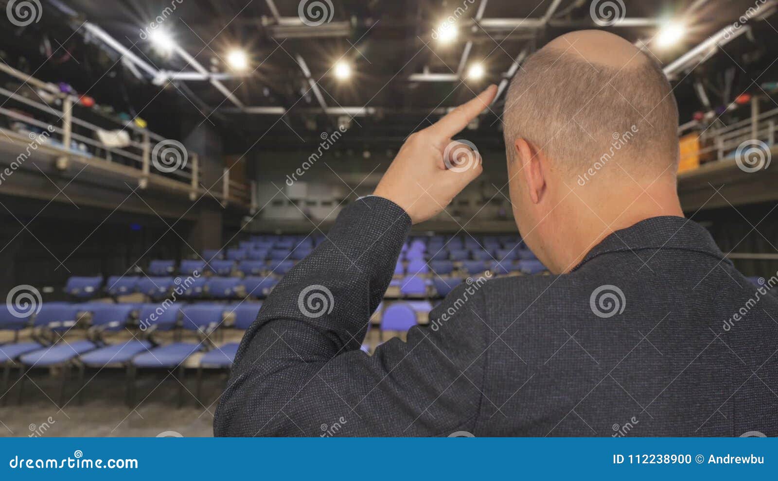 Speaking Man Knocking Finger on Forehead Back View during Performance ...
