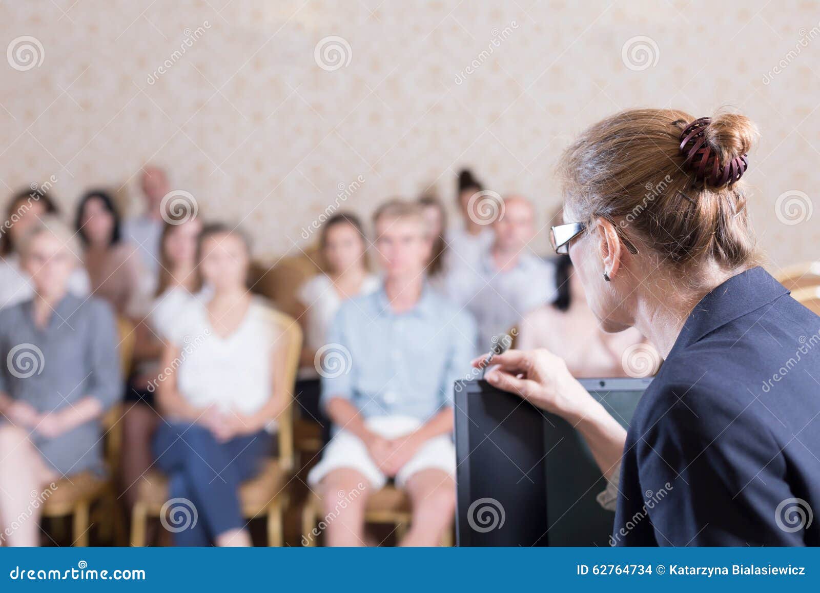 Speaking into the Microphone Stock Photo - Image of business, people ...
