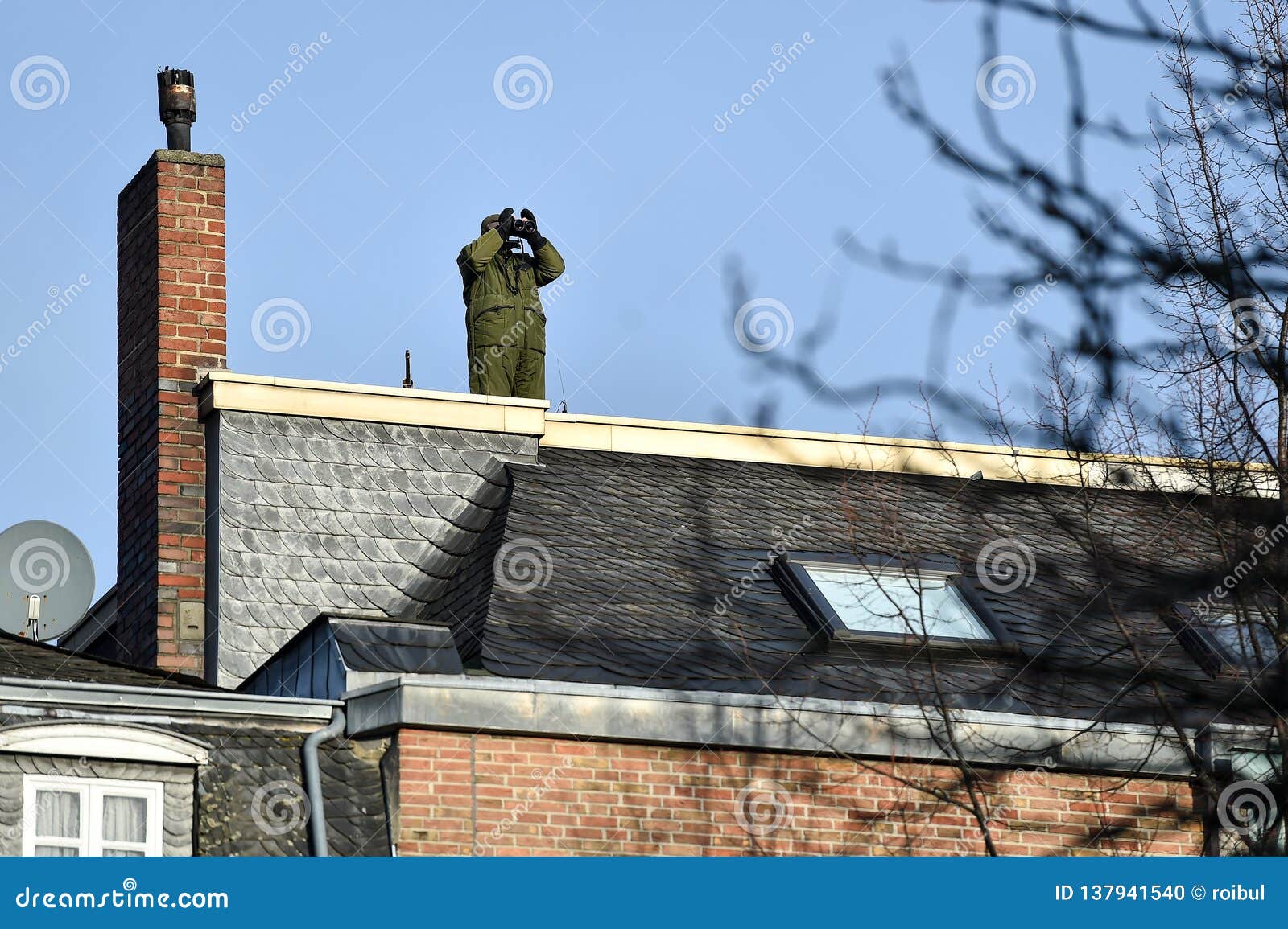Sniper Securing a Perimeter from a Rooftop Stock Photo - Image of ...