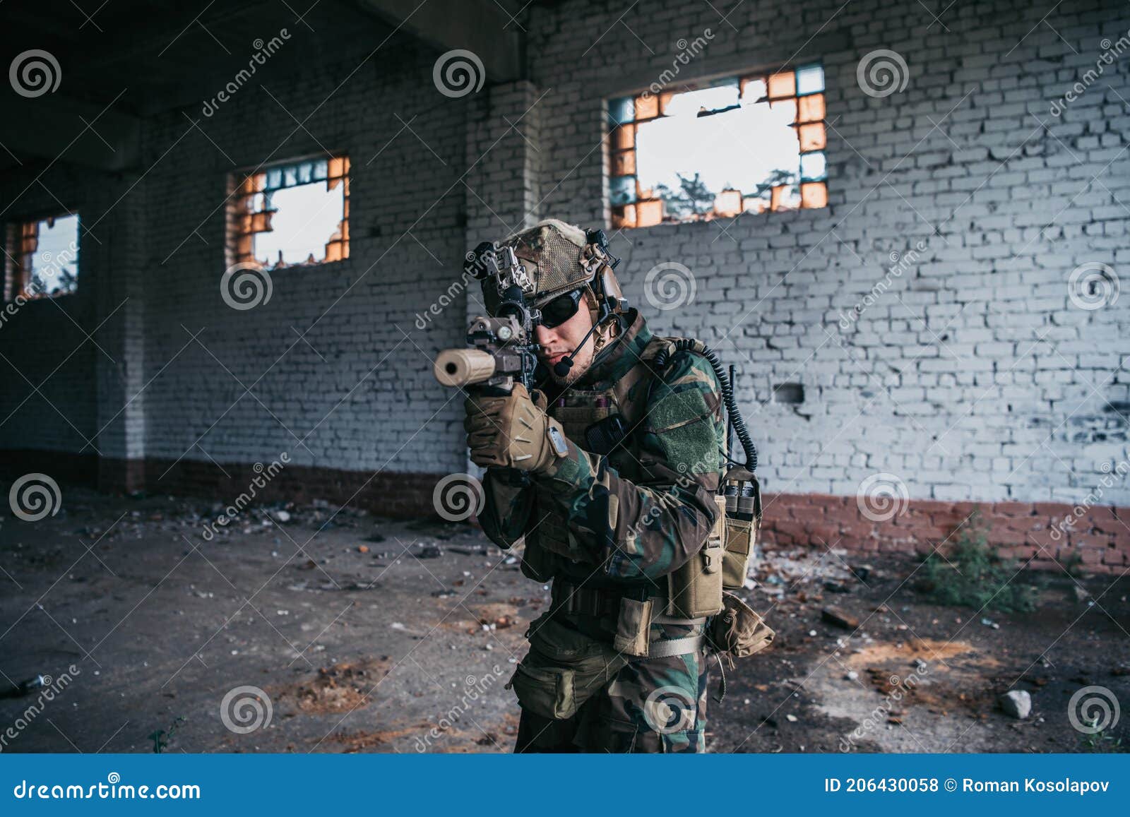Special Forces Soldier Walking with Aimed Assault Rifle in Destroyed ...