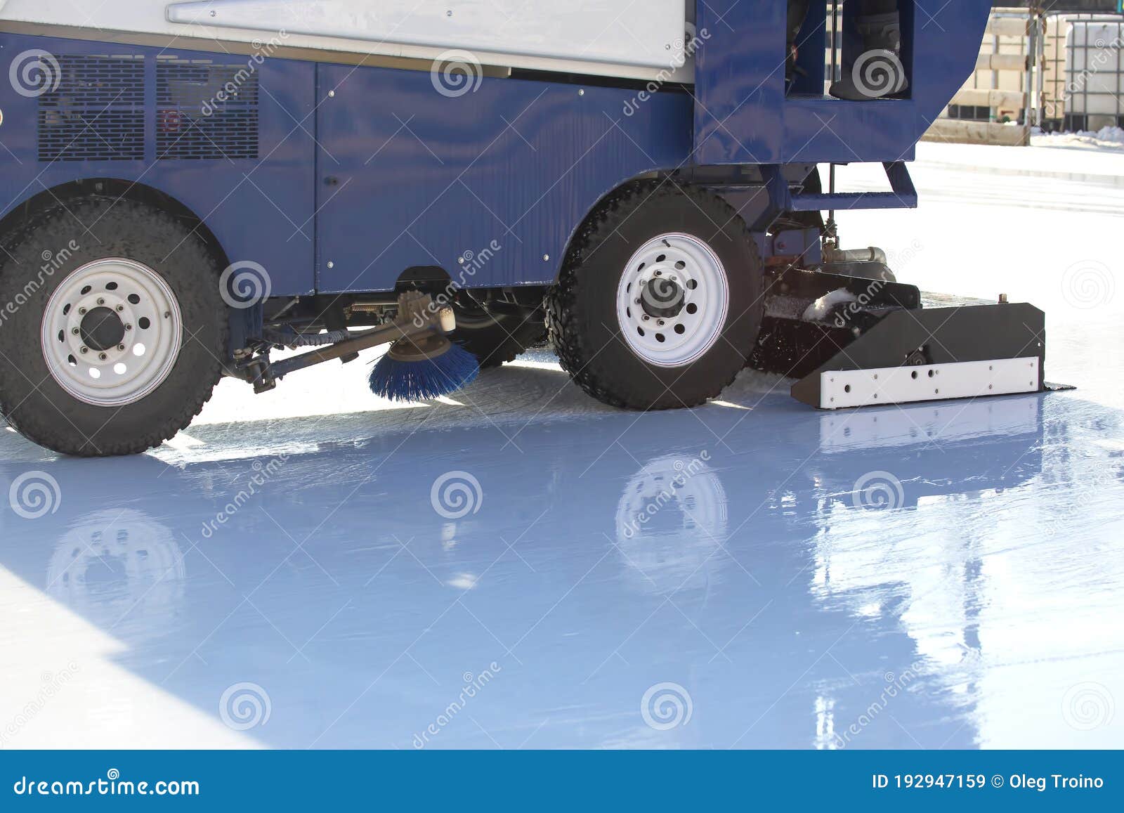 Special Machine for Cleaning Ice on an Ice Rink at Work. Transport ...