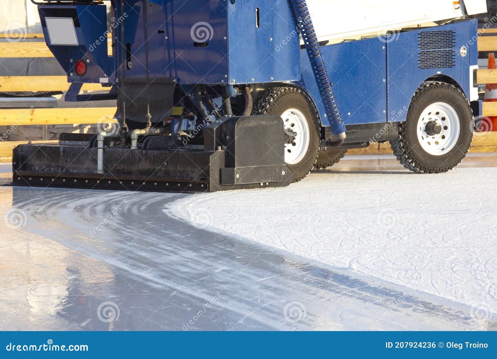 Special Machine for Cleaning Ice on an Ice Rink at Work. Transport ...
