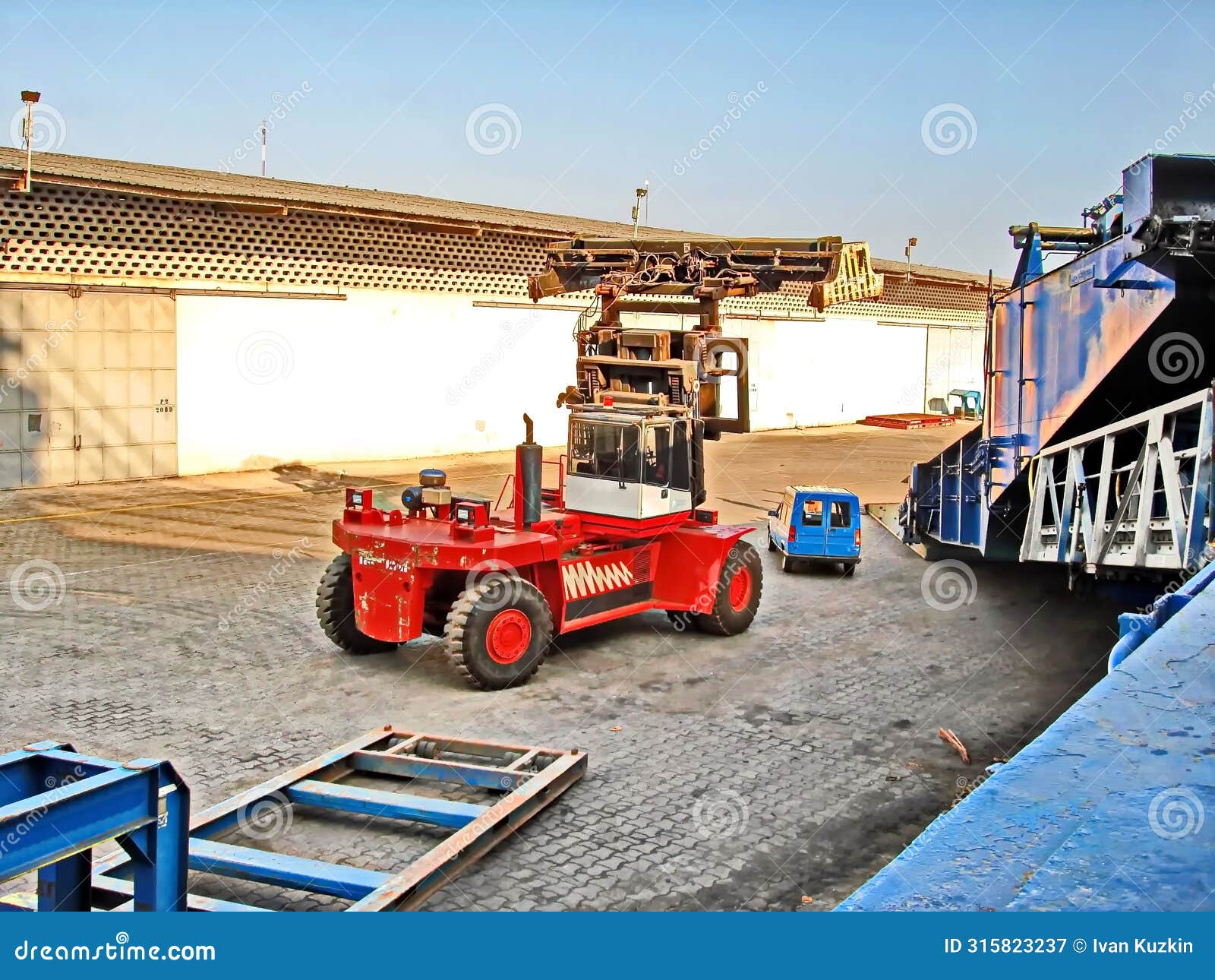 Special Machines - a Heavy Forklift with a Special Attachment Used for ...