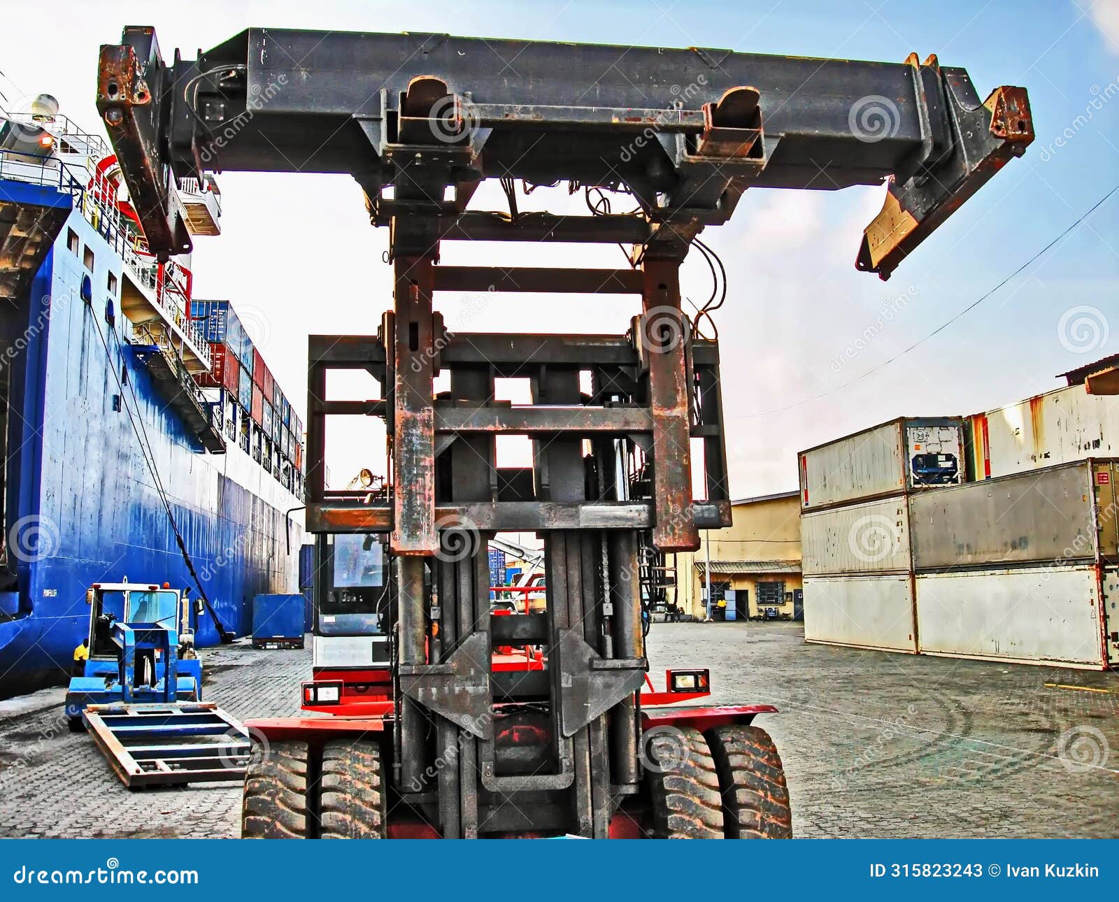Special Machines - a Heavy Forklift with a Special Attachment Used for ...