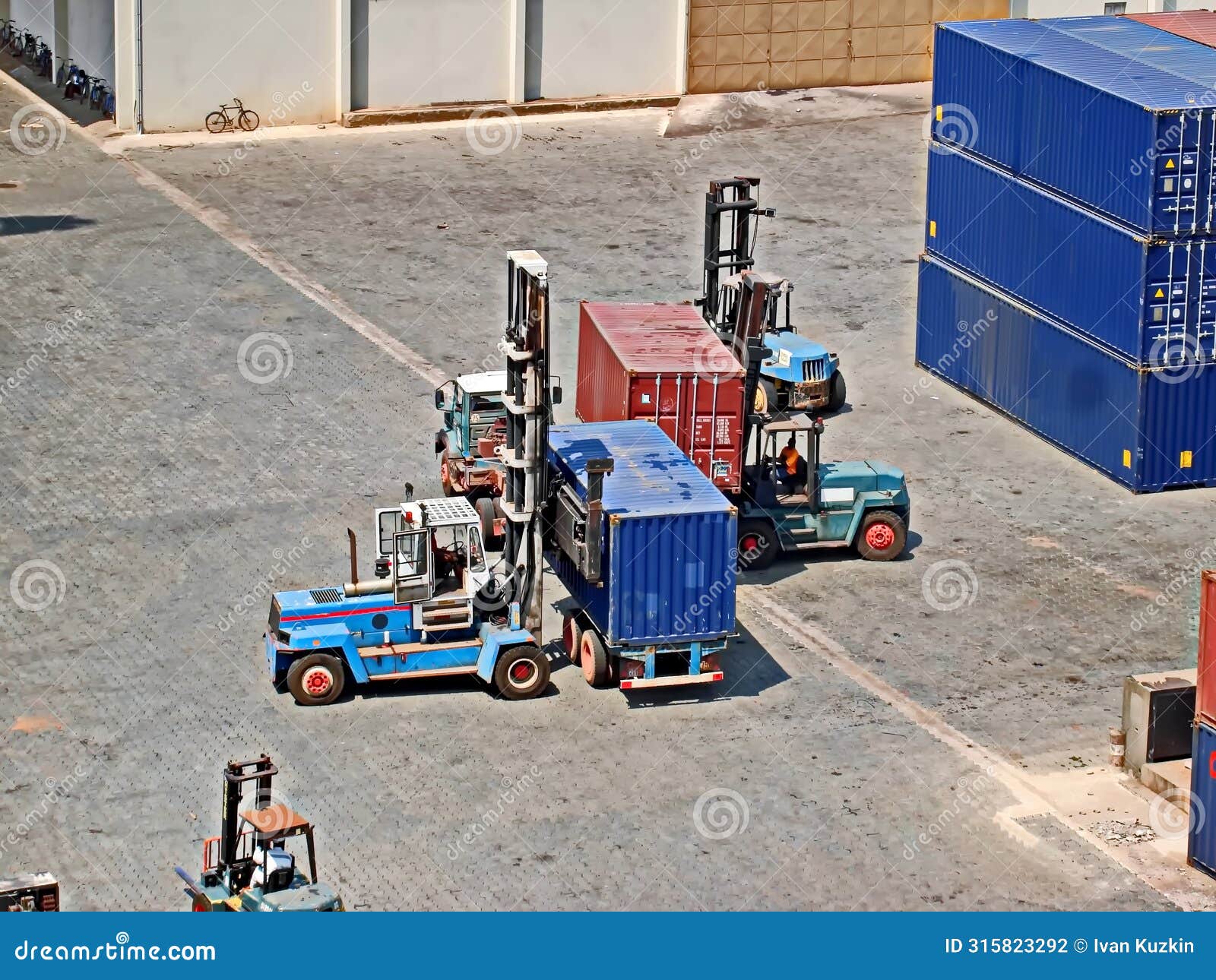 Special Machines - A Heavy Forklift With A Special Attachment Used For ...