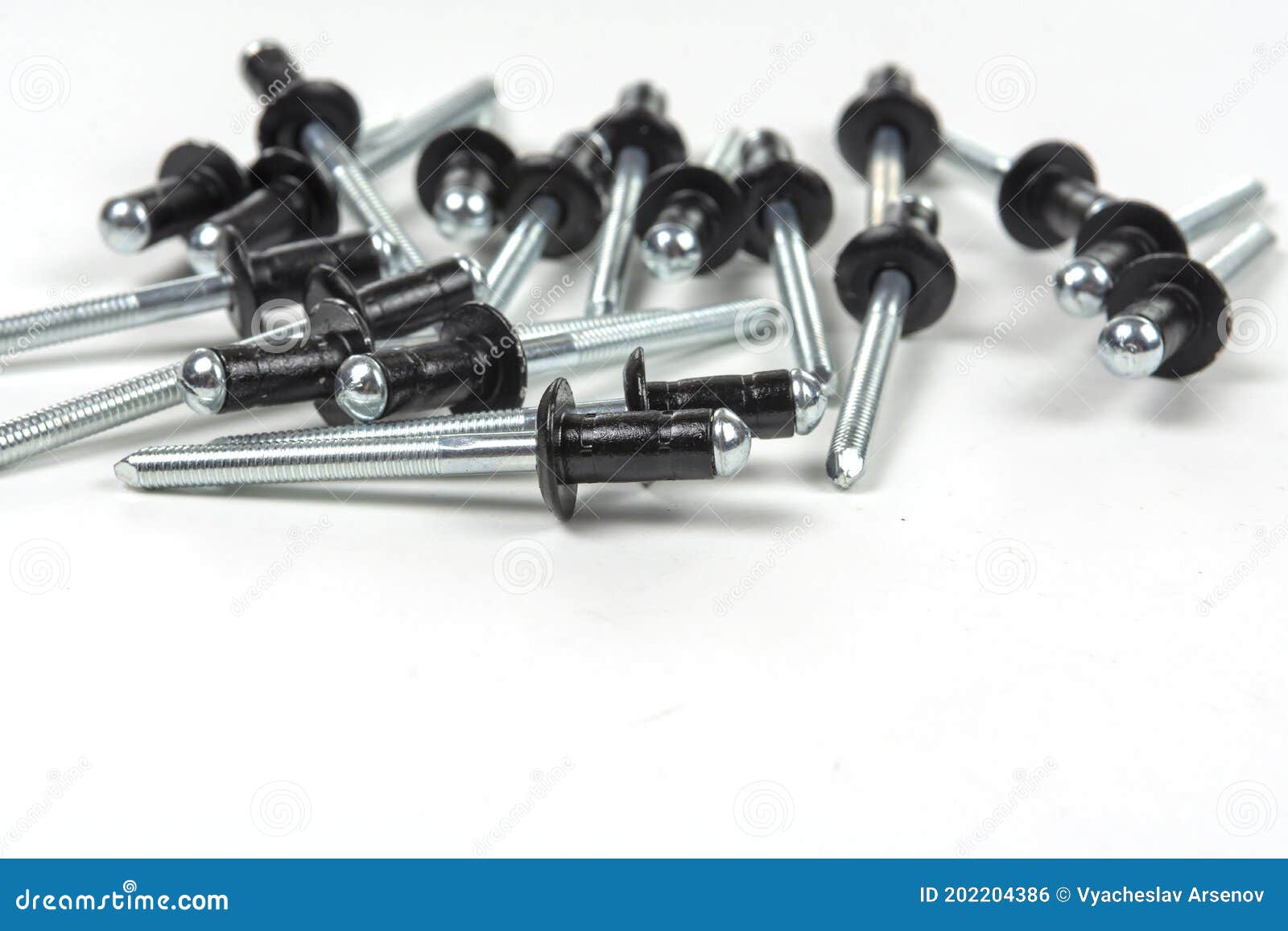 Special Metal Rivets in Bulk on a White Background Stock Photo - Image ...