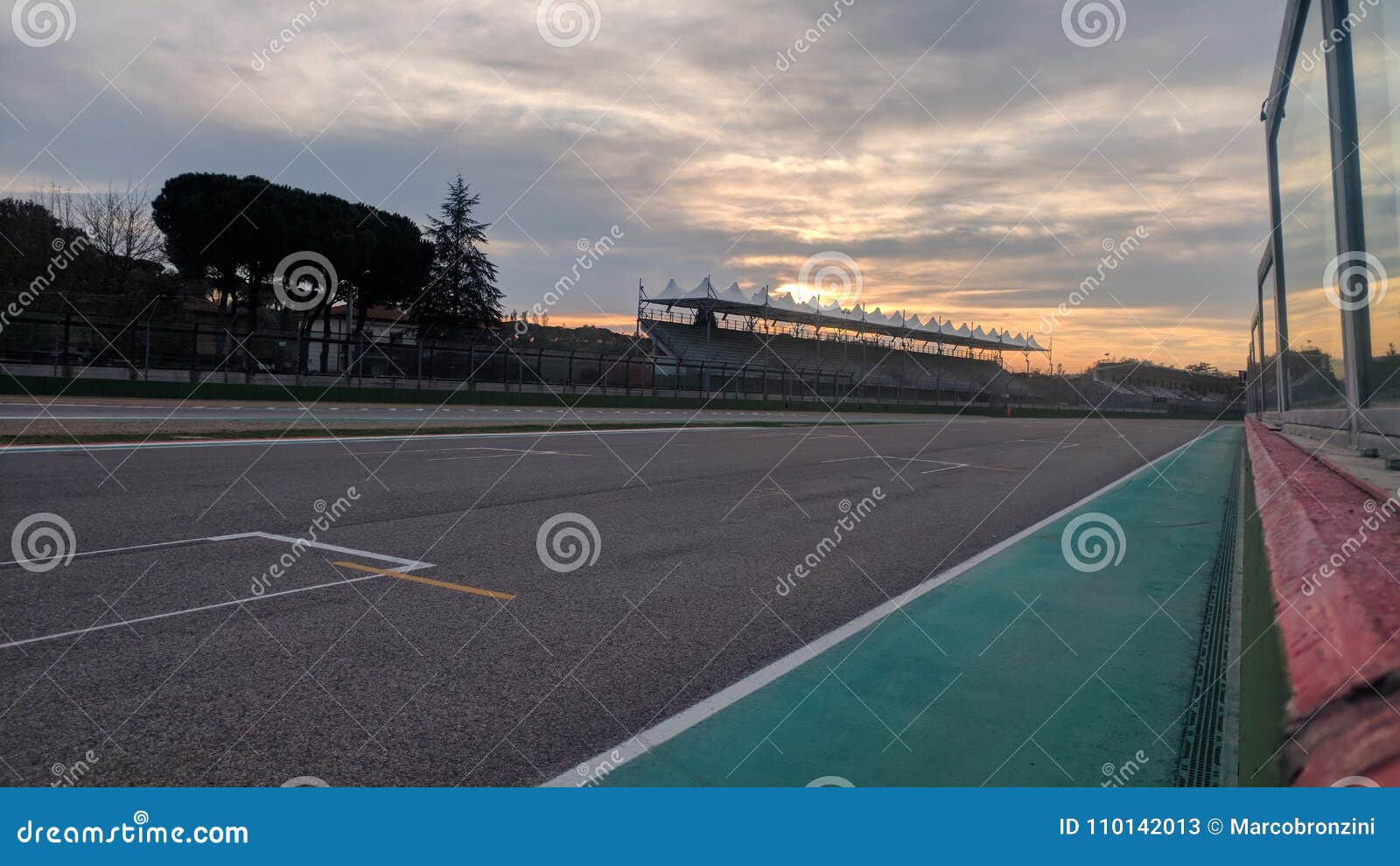 Racing circuit editorial stock photo. Image of sunset - 110142013