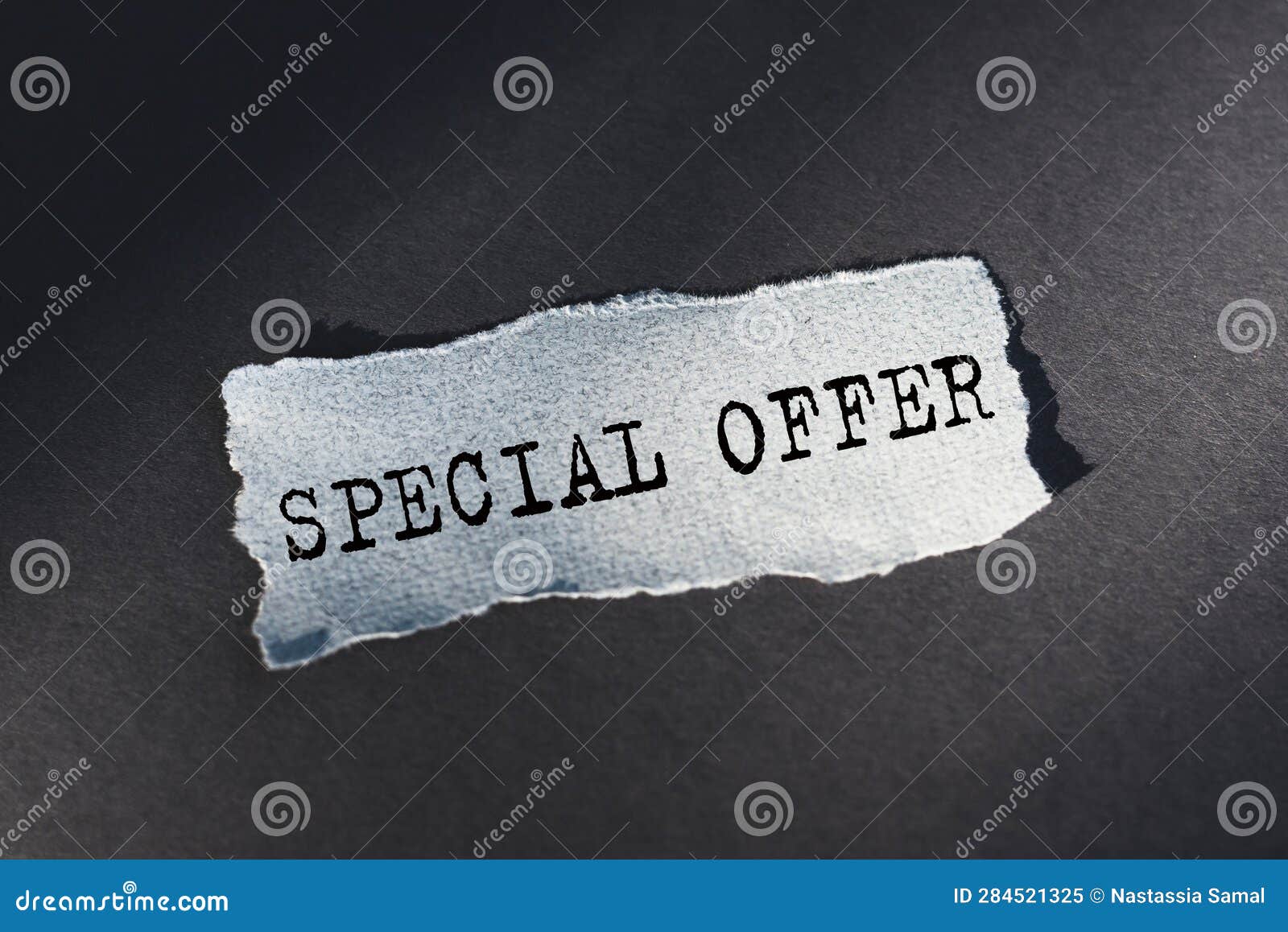 Special Offer Text on Torn Paper on Craft Paper Background Stock Image ...