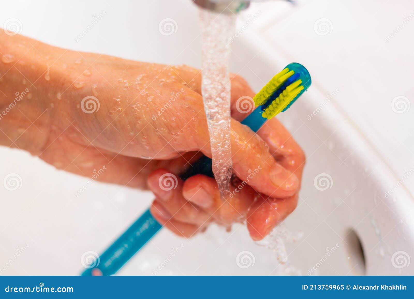 Special Toothbrush Under the Running Water in Bathroom Stock Image ...