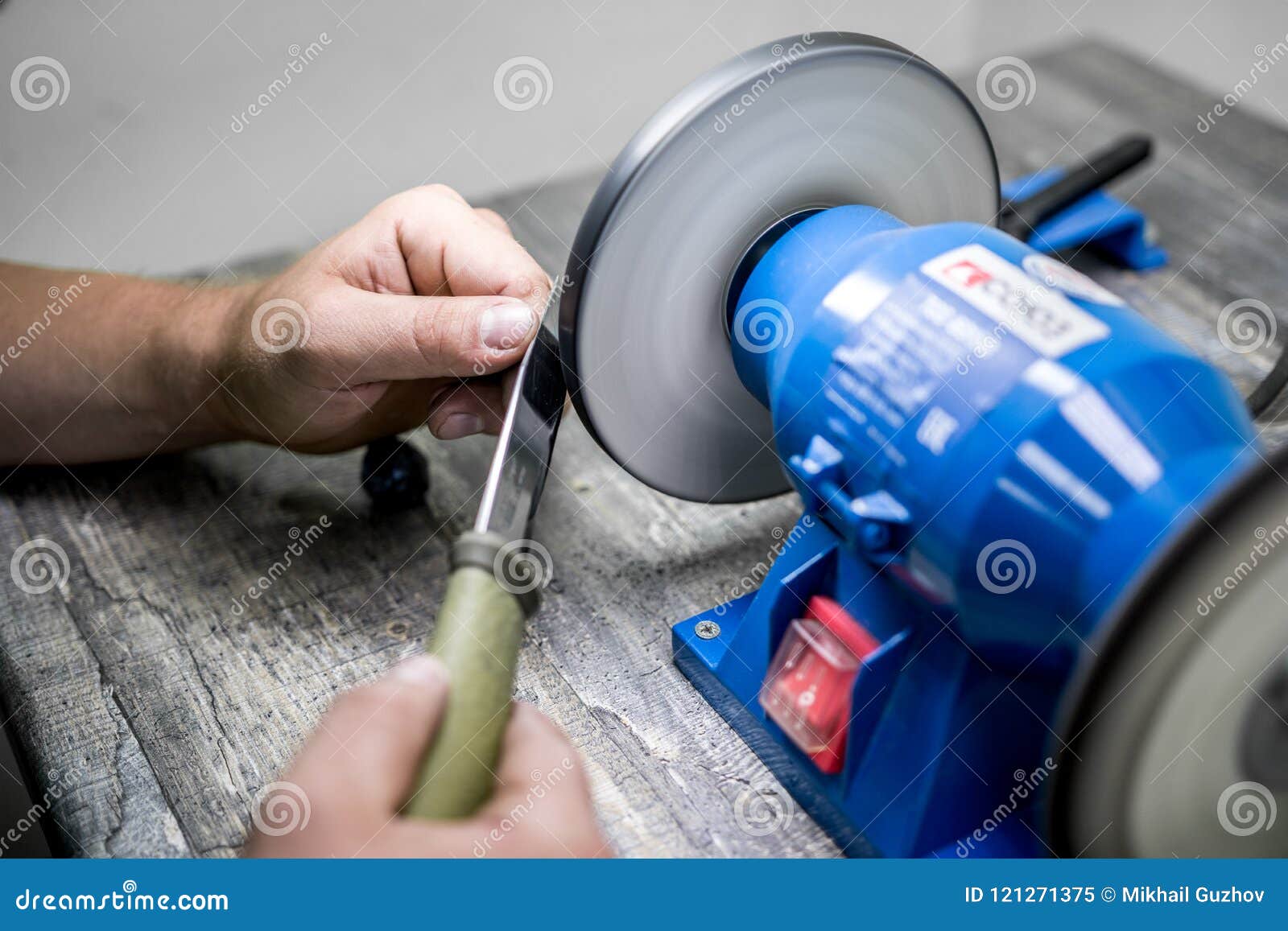 Sharpening the Knife with a Special Machine Stock Image - Image of ...
