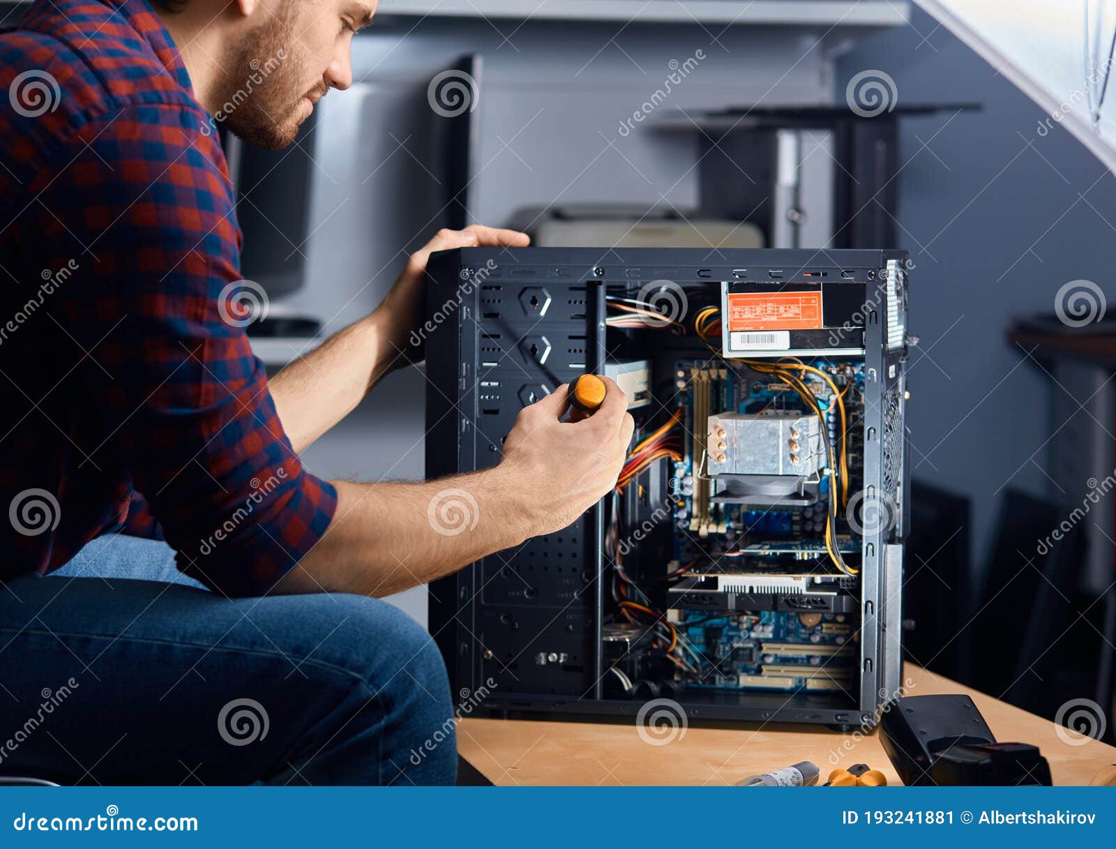 Specialised Computer Repair Technician Testing an Old System Unit Stock ...