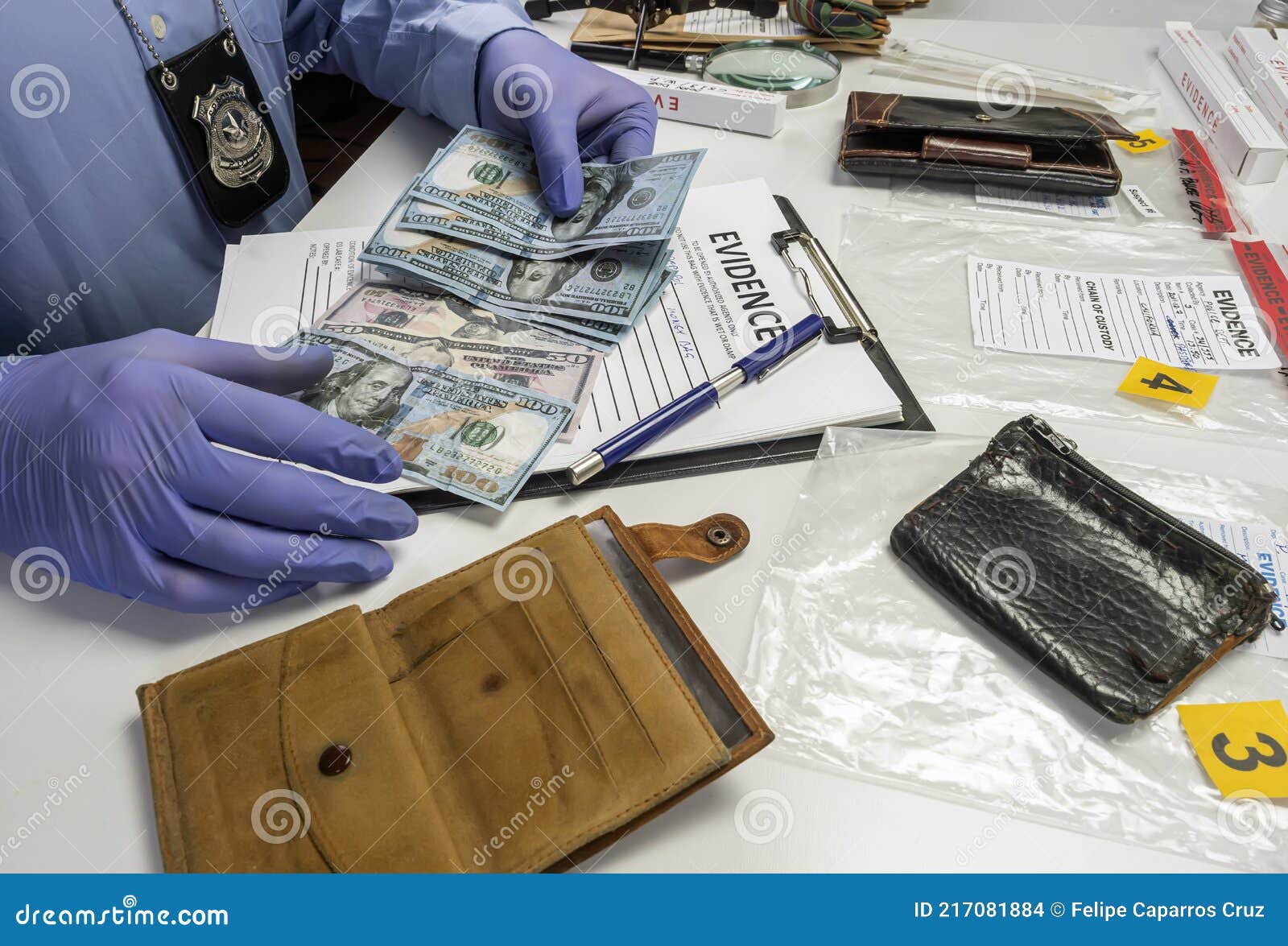 Specialised Police Officer Notes Dollar Banknote Reference of a Robbery ...