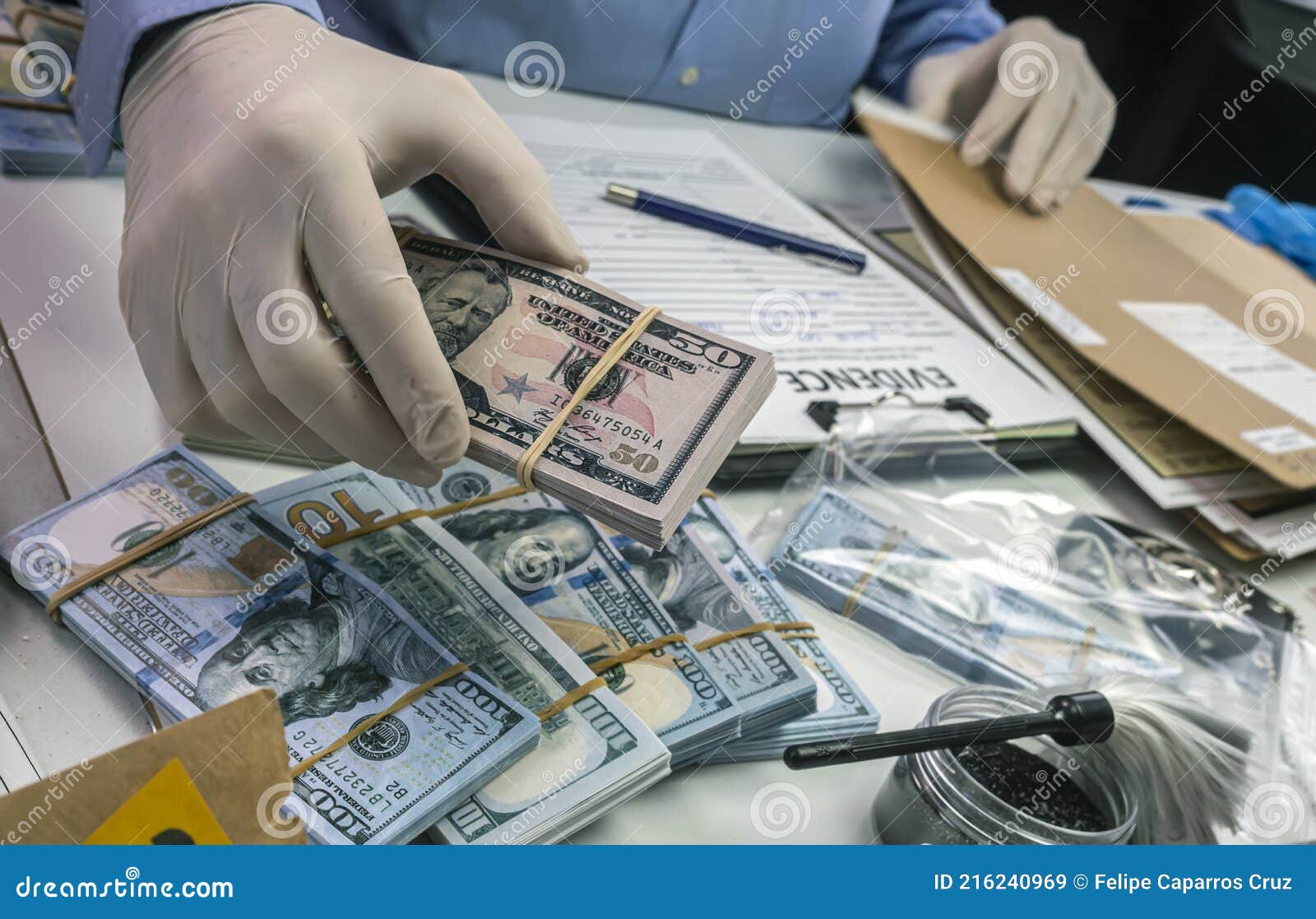 Specialised Police Officer Notes Dollar Banknote Reference Of A Robbery ...