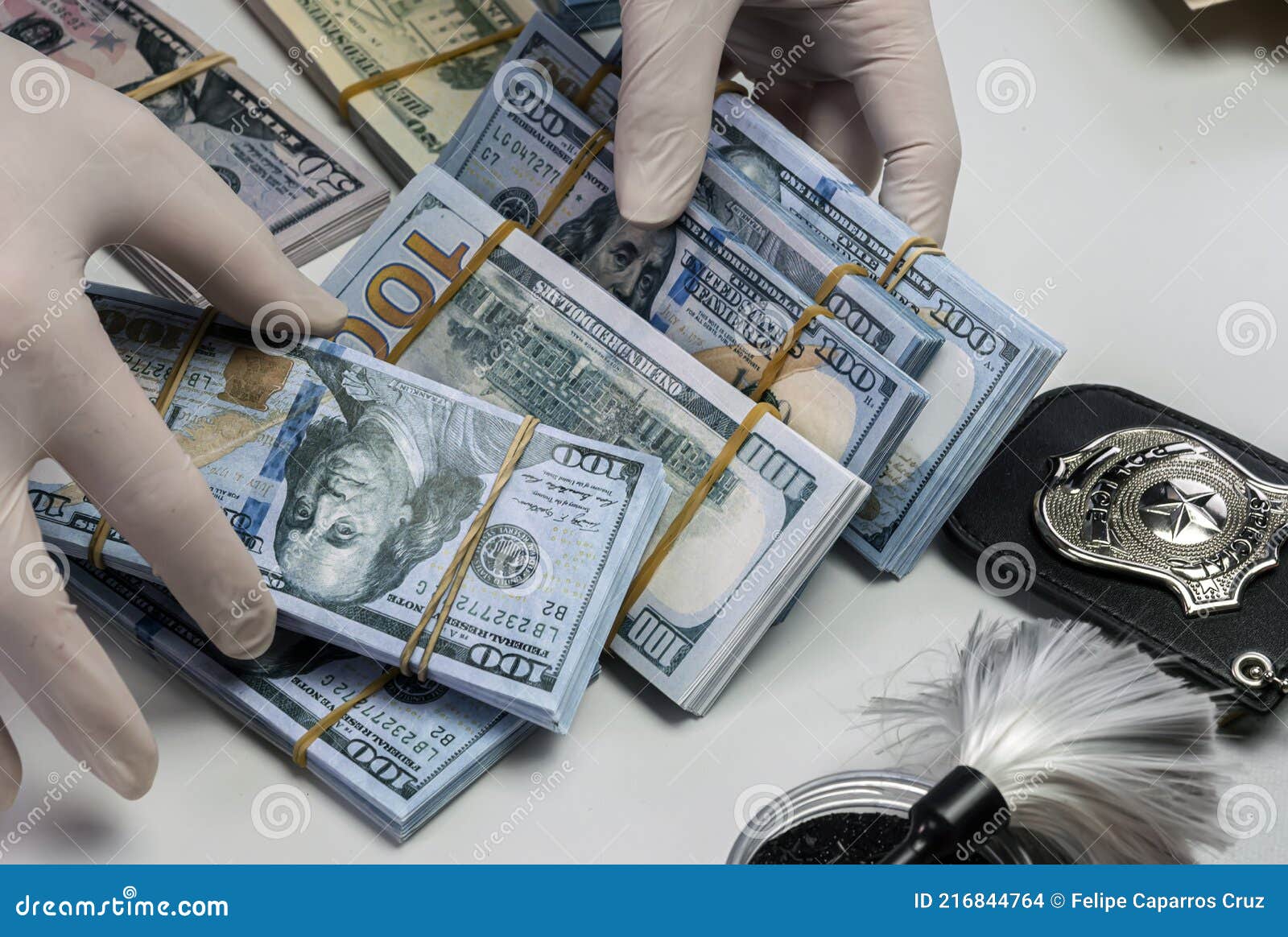 Specialised Police Officer Notes Dollar Banknote Reference of a Robbery ...