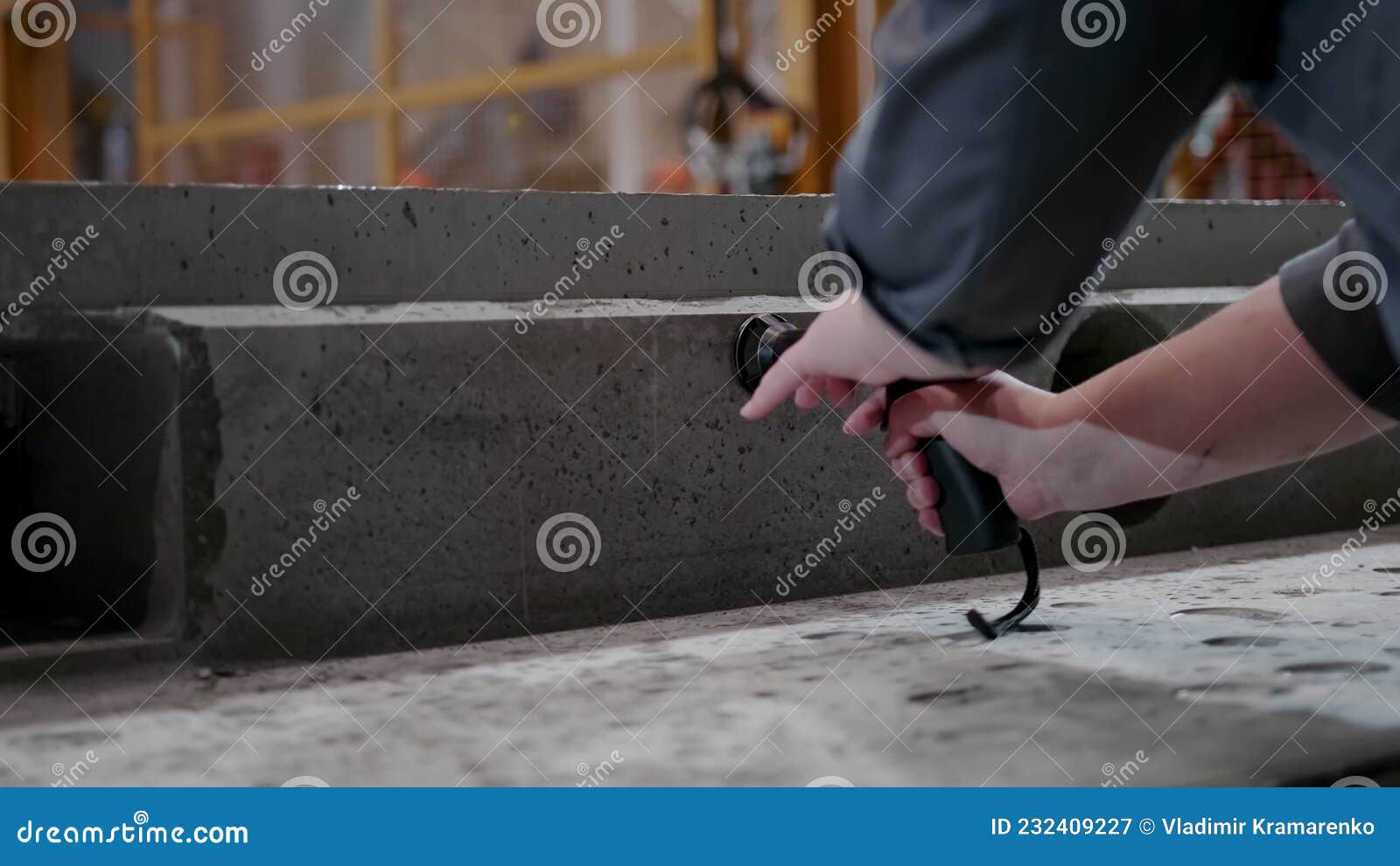 A Specialist Checks the Quality of the Concrete Product at the Plant ...