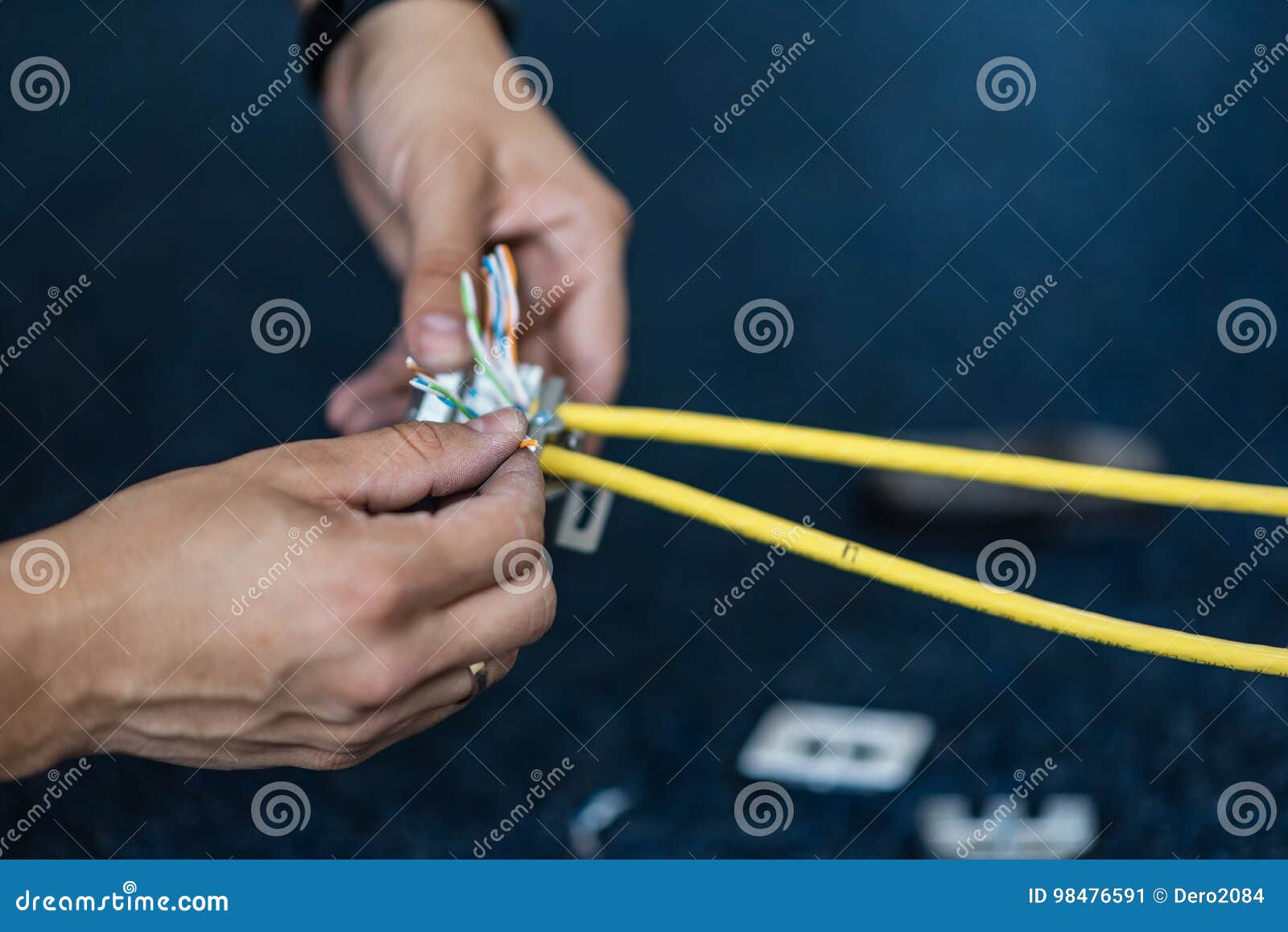 Specialist Connect a Network Cable with RJ45 Sockets, Process of Laying ...