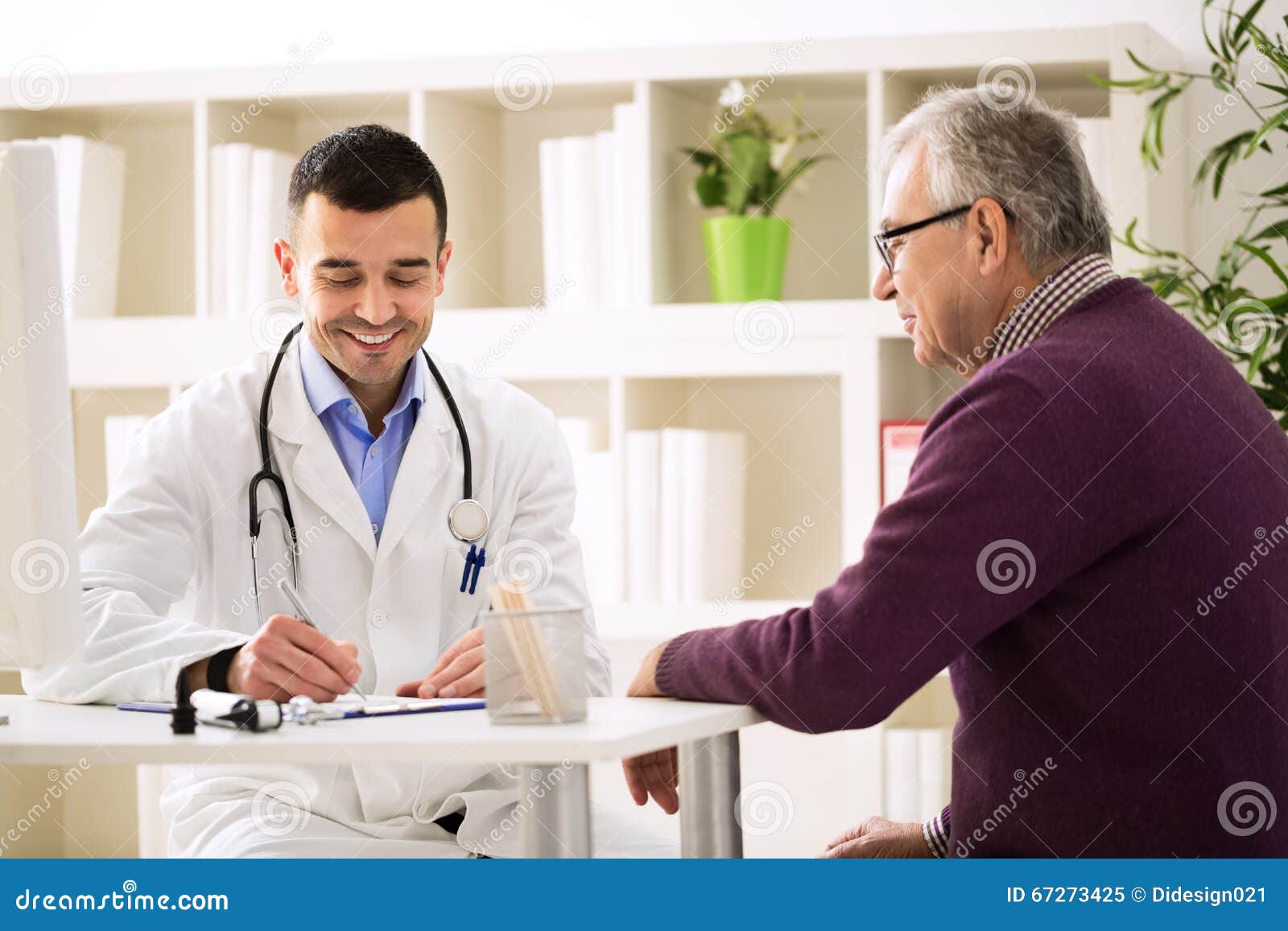 Specialist Doctor and Patient Smiling and Talking Stock Image - Image ...