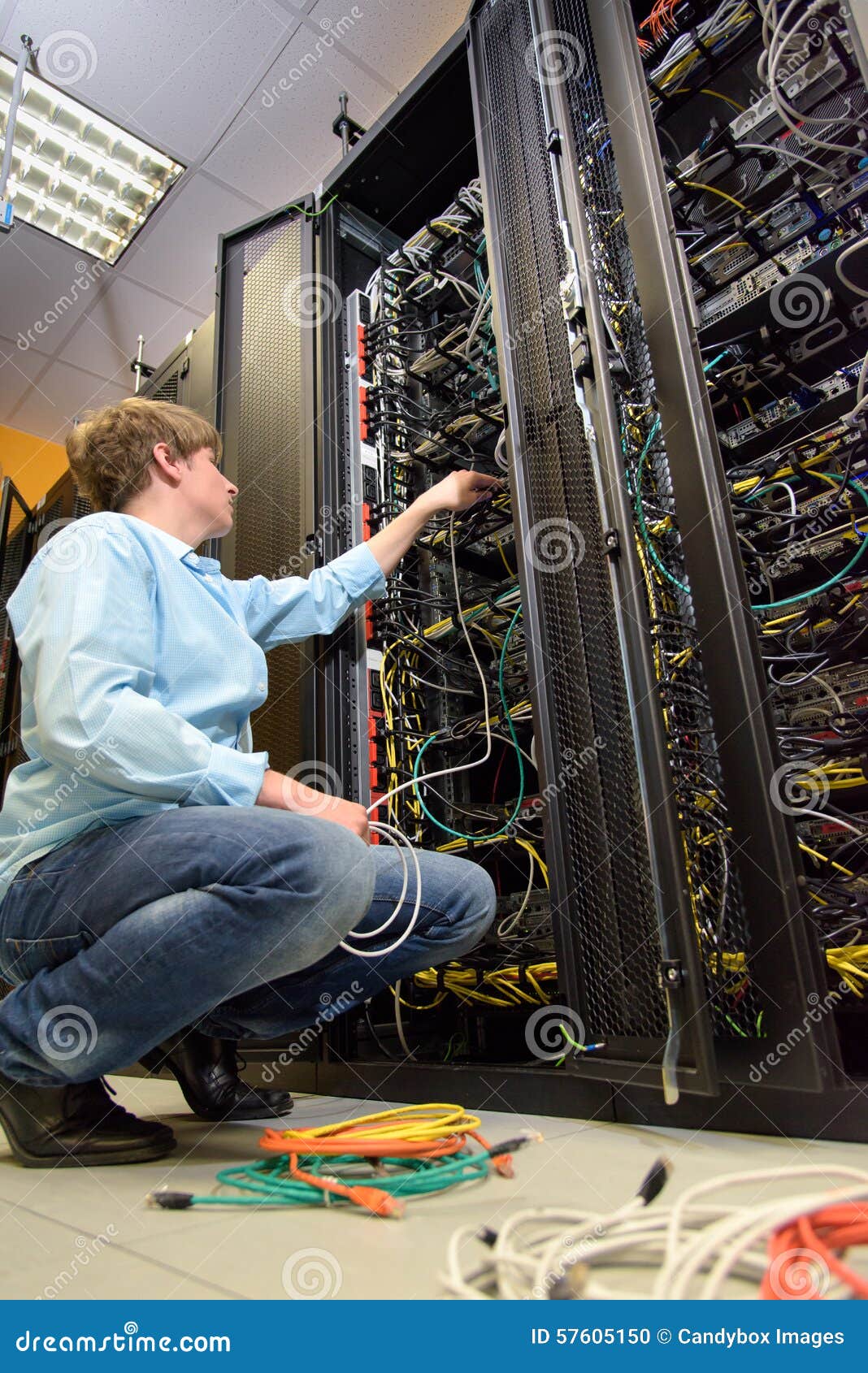 It Specialist Installing Cables in Datacenter Stock Photo - Image of ...