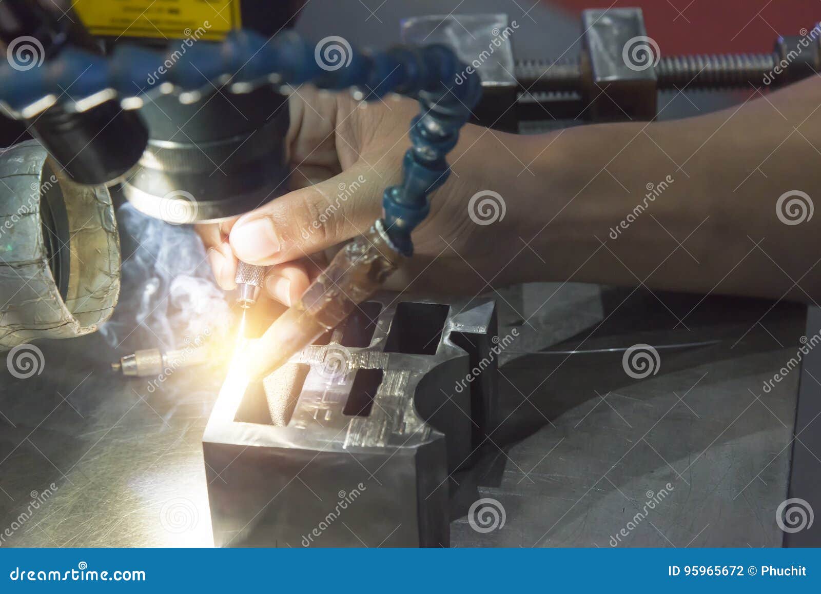 The Specialist Operator Use the Laser Welding Machine. Stock Photo ...