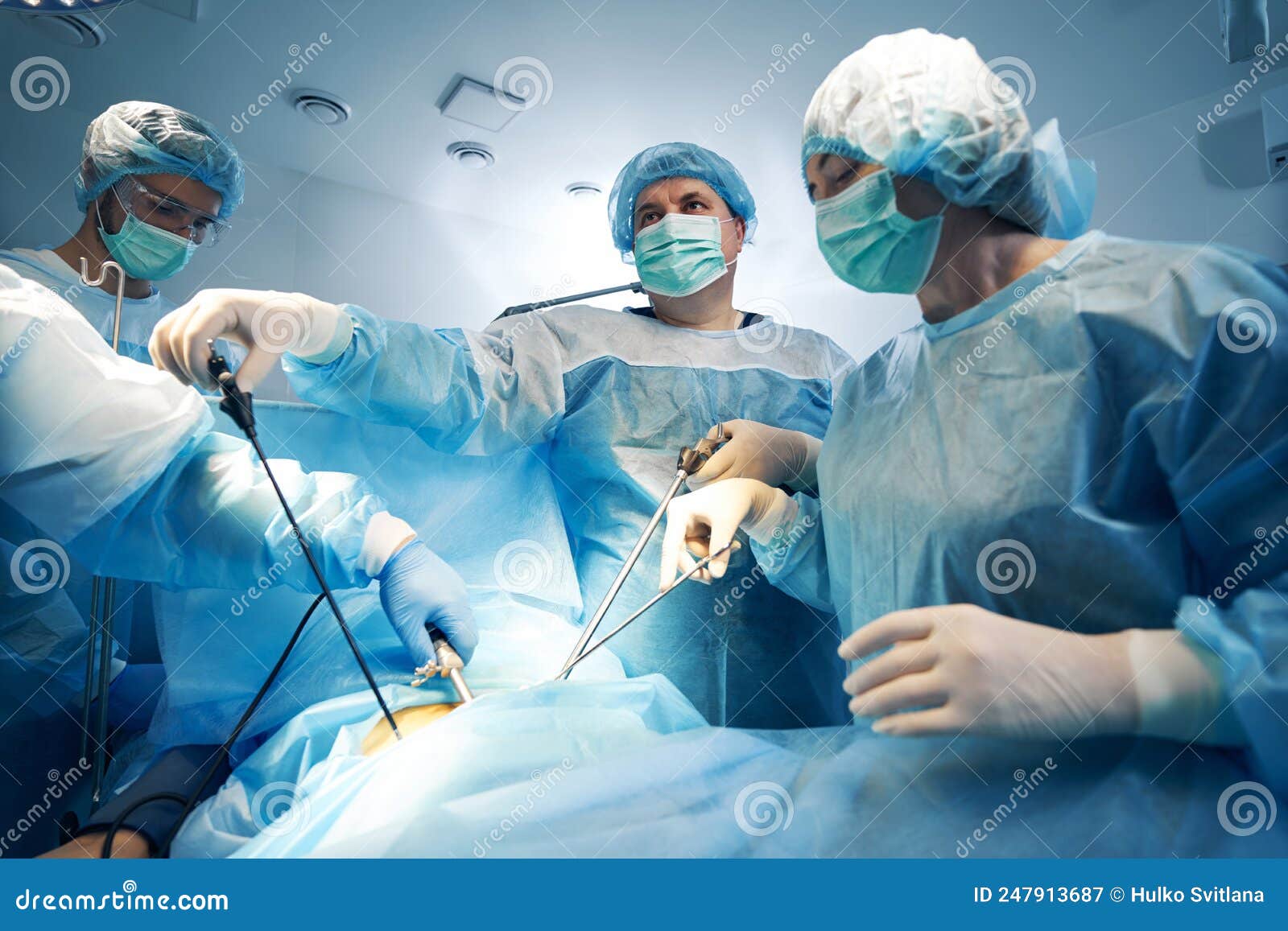 Specialist in Surgery Using Laparoscopic Tools while Operating on ...