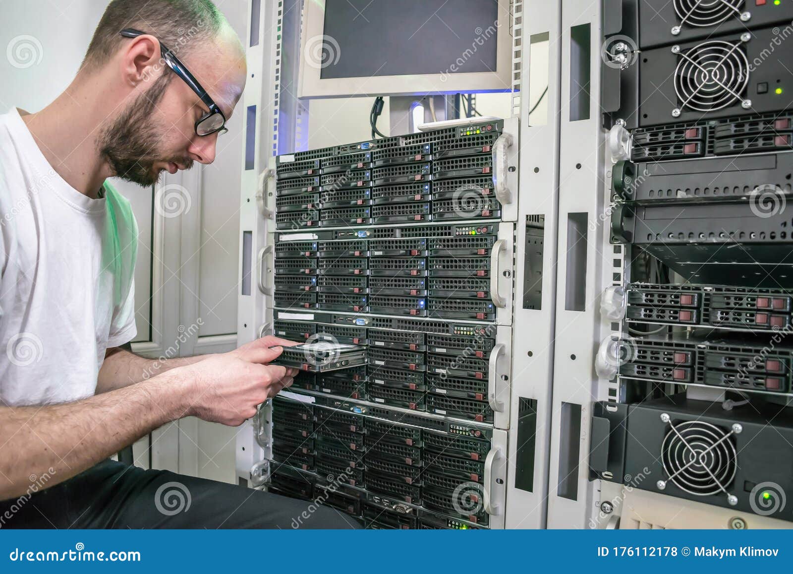 The Specialist Updates the Data Center Computer Equipment. Technician ...
