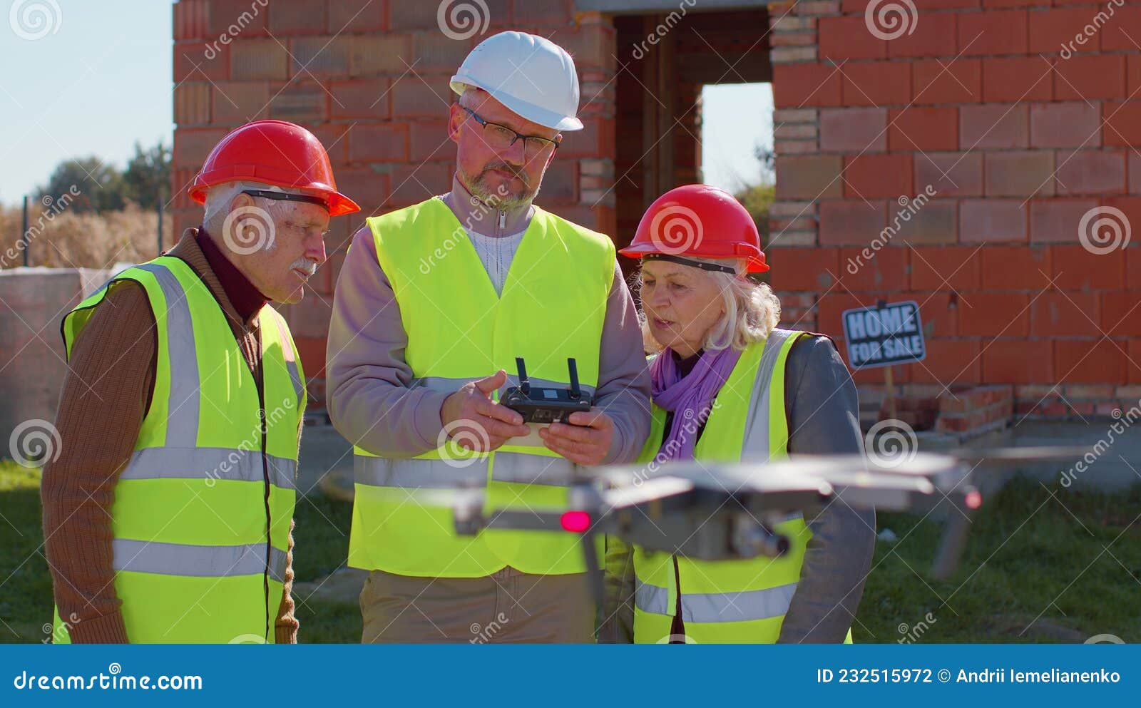 Specialist Worker Fly on Drone on Building Construction Site, Showing ...