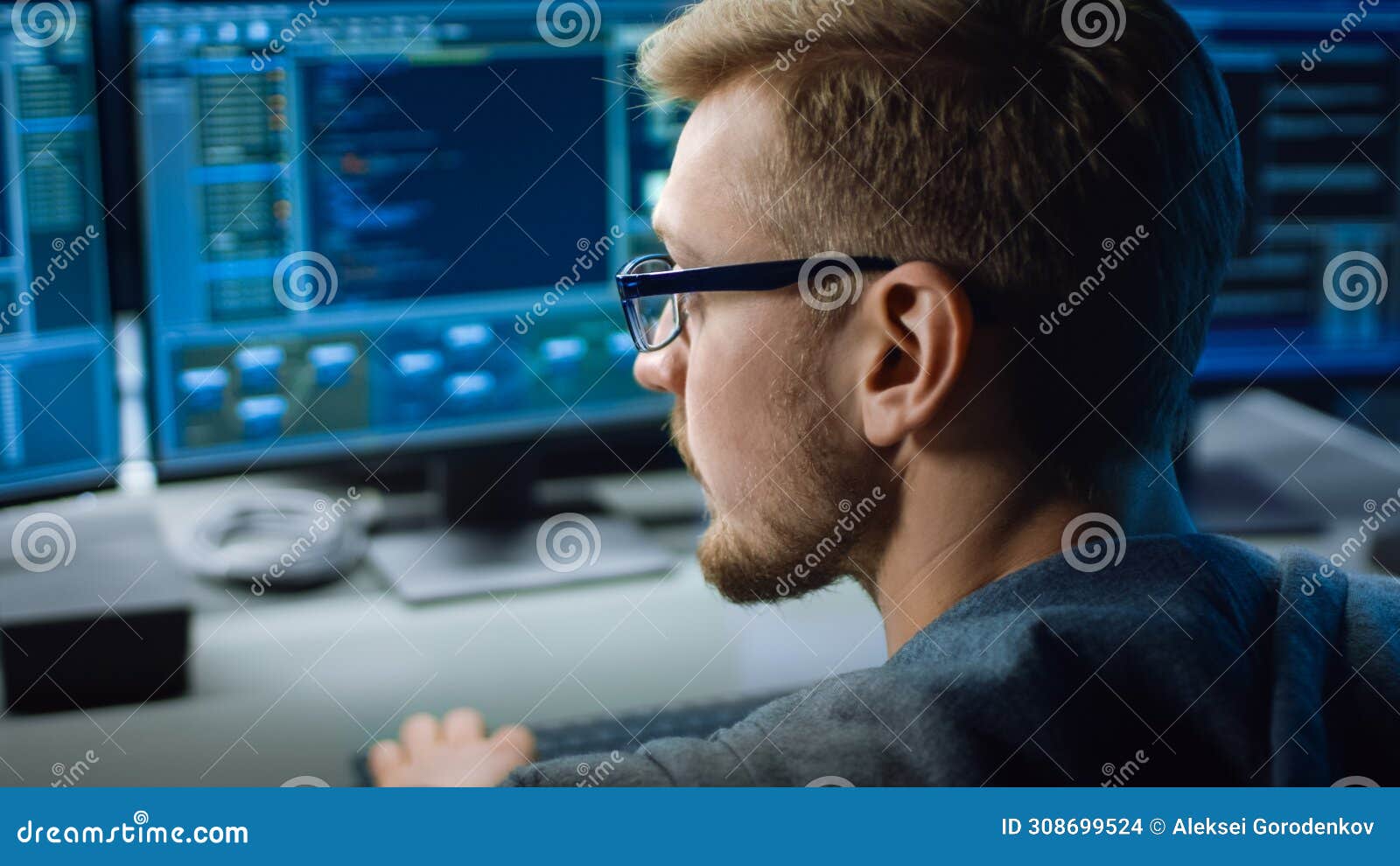 It Specialist Works on Personal Computer with Screens Showing Software ...