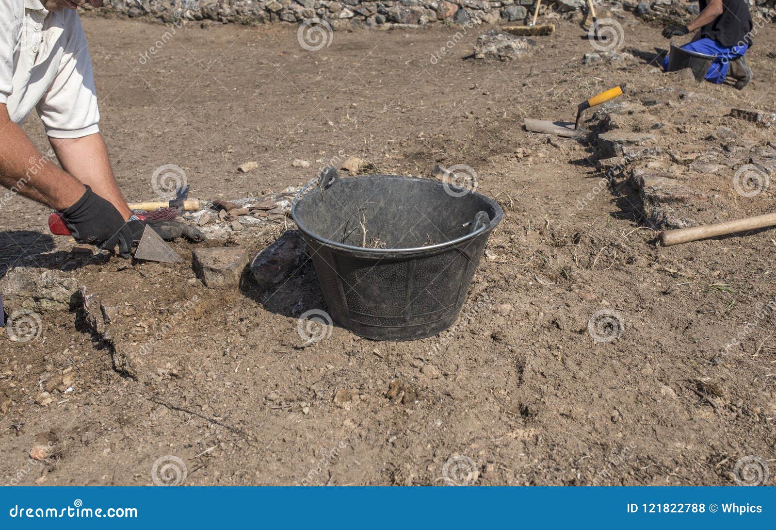 Specialized Workers Digging with Trowel on Archaeological Excavation ...
