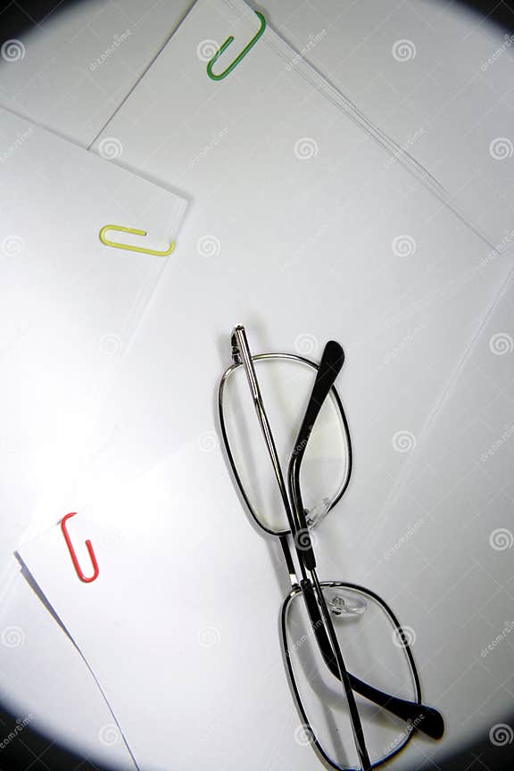 Spectacles on papers stock photo. Image of vertical, clamped - 2570736
