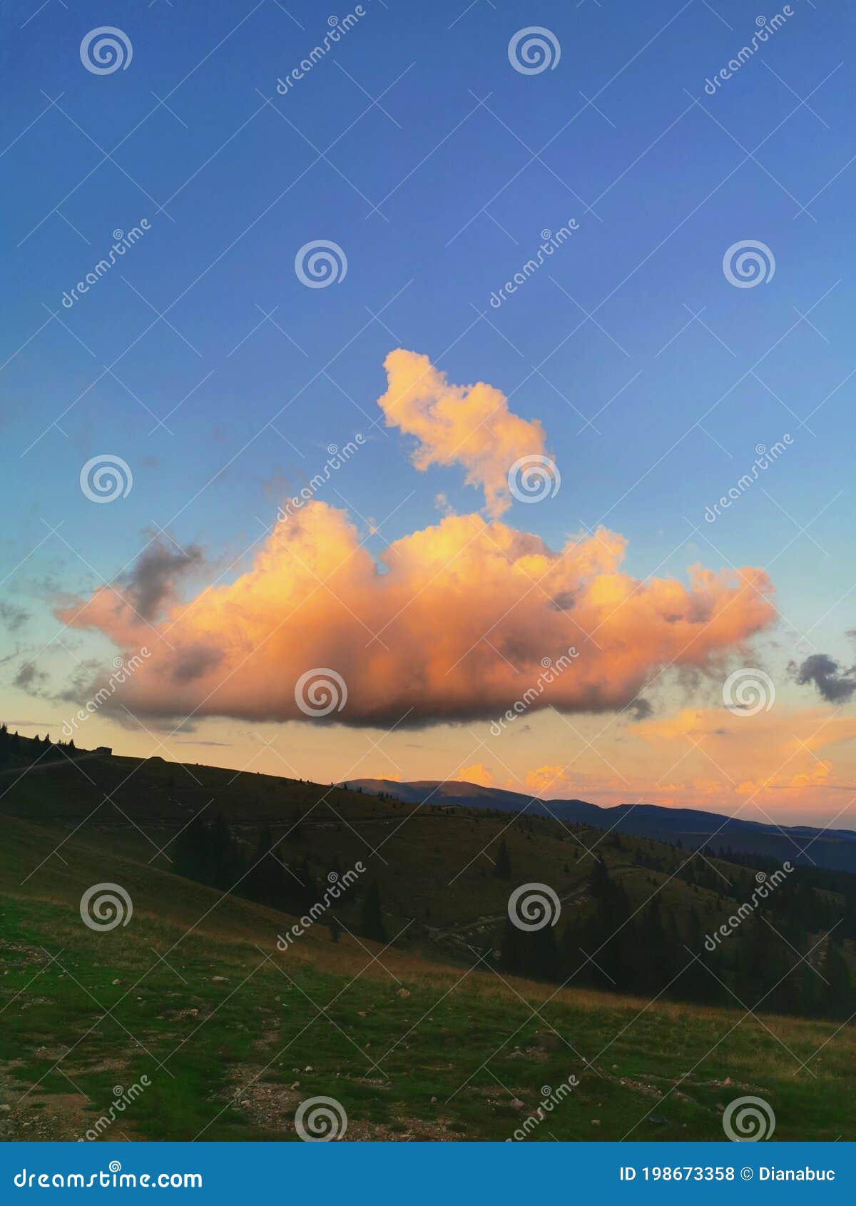 Spectacular coloured cloud stock photo. Image of grassland - 198673358