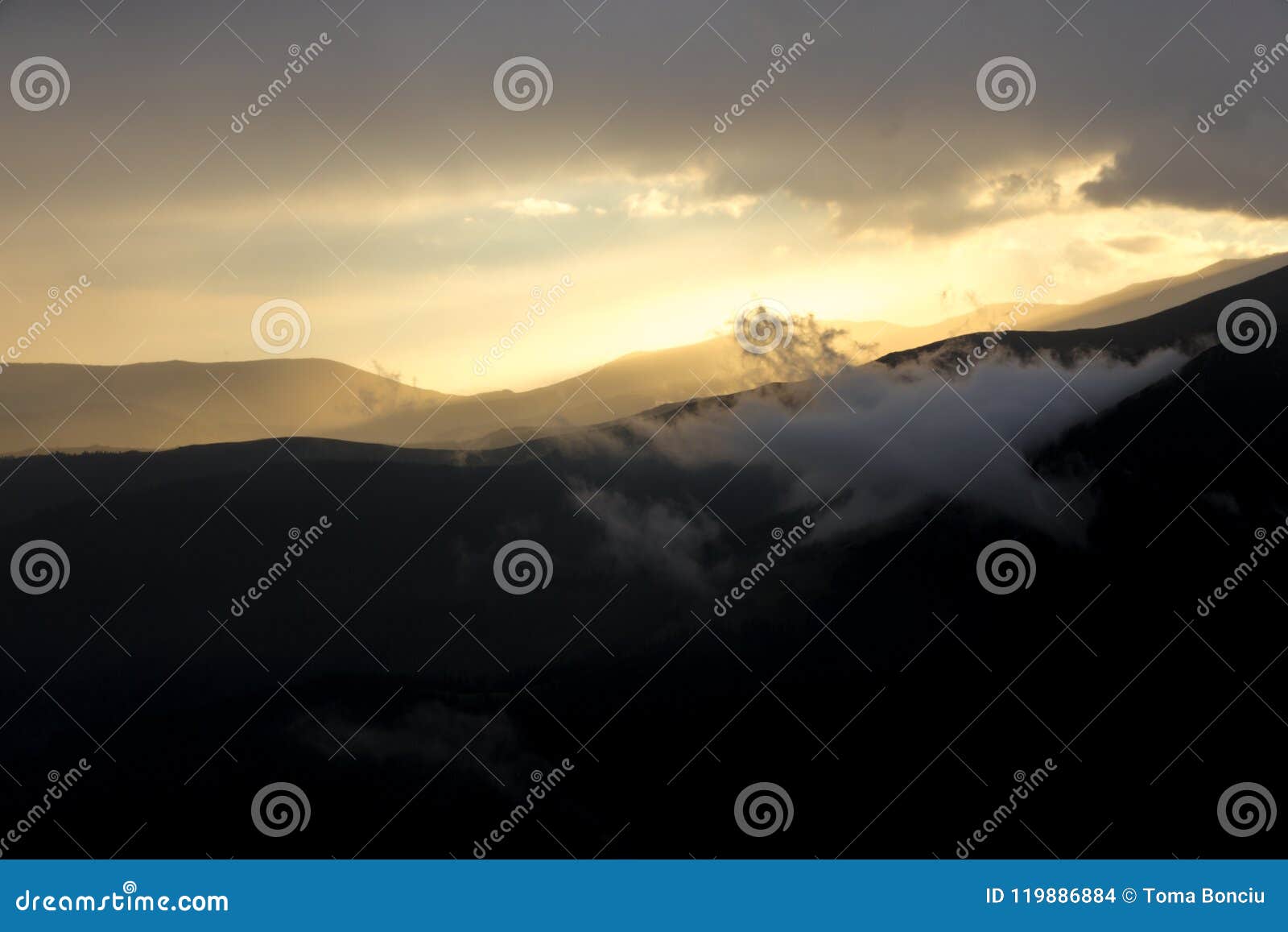 Spectacular Light during Sunset in the Mountains. Dramatic Cloud Stock ...