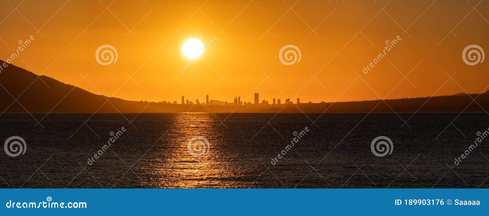 Spectacular Sun on Benidorm Skyline at Sunset with Orange Sky Stock ...