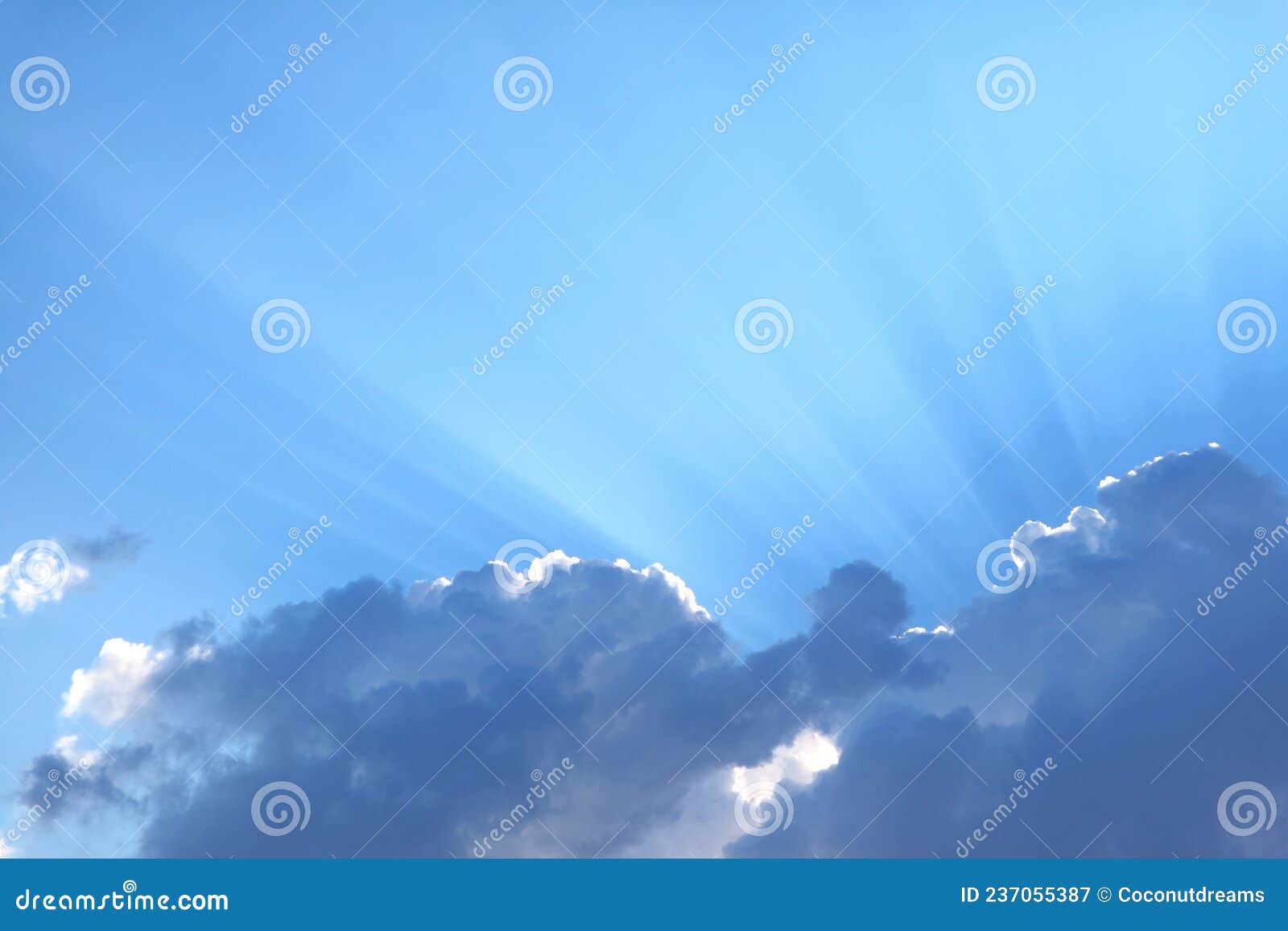 Spectacular Sun Rays Shining through the Fluffy Clouds Stock Image ...