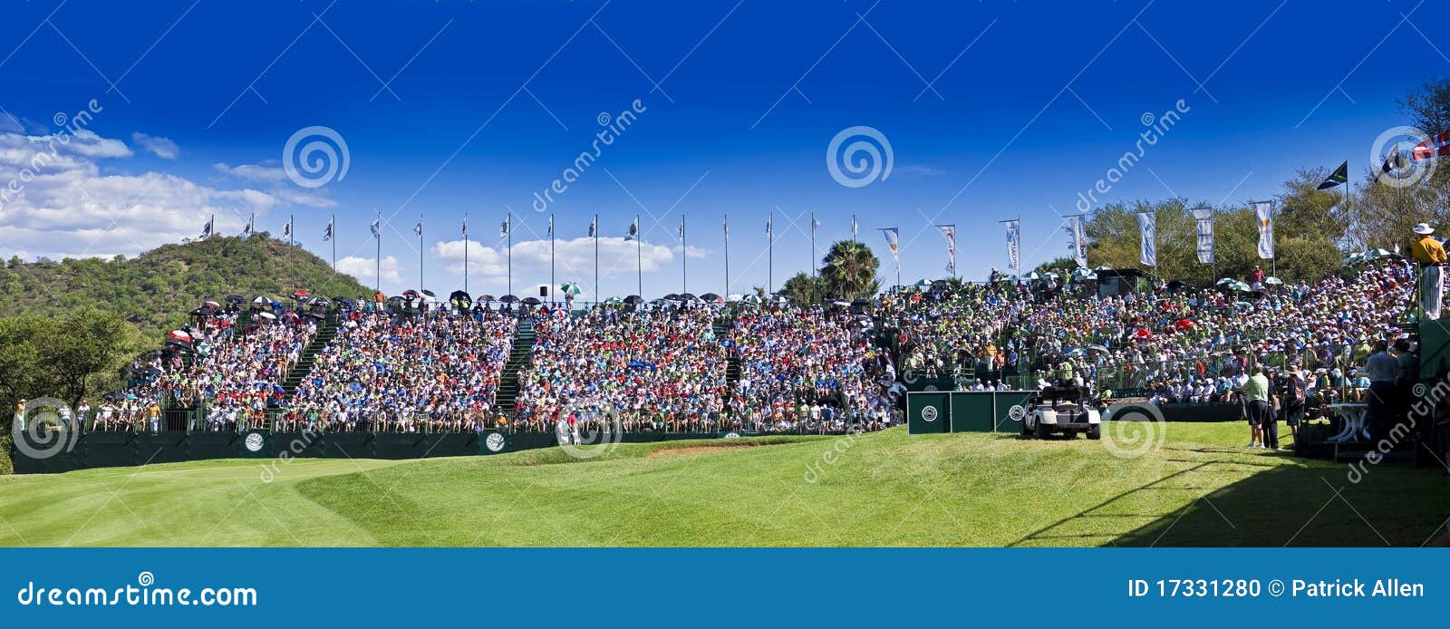 Spectators on the 18th editorial image. Image of brolly - 17331280