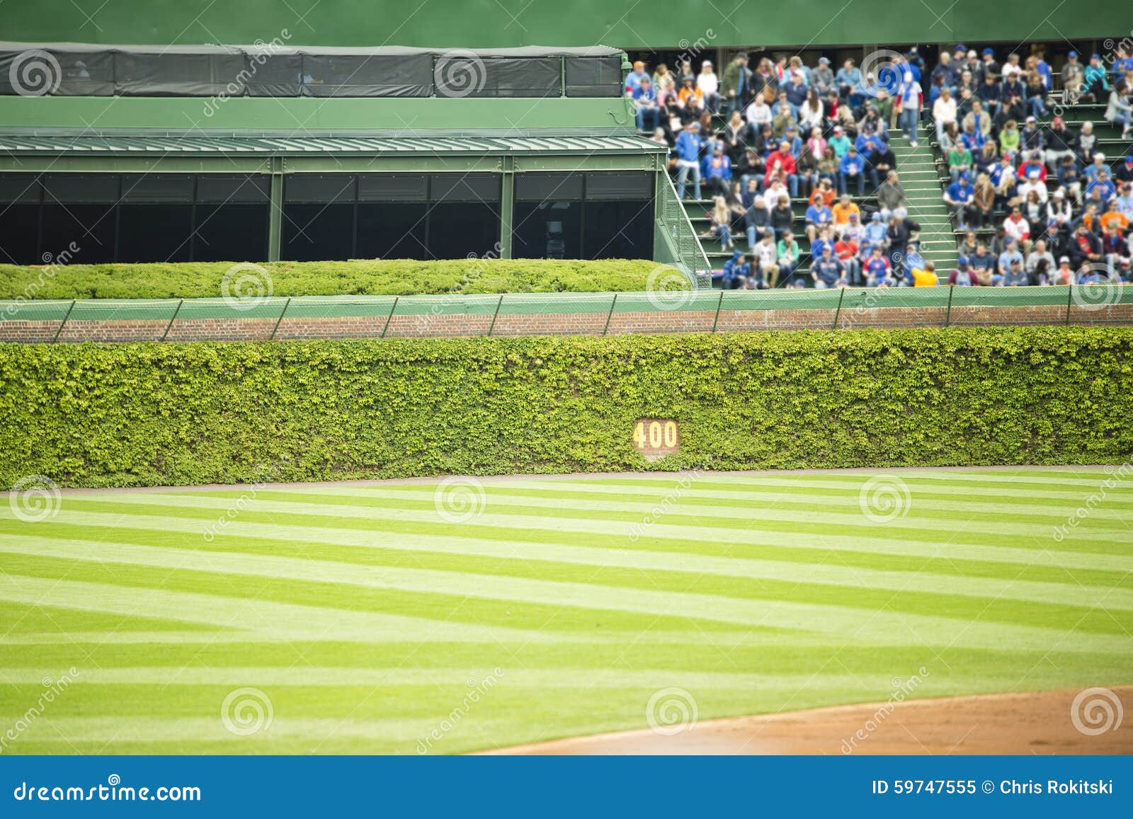 Spectators Watching Baseball from the Outfield Seating Stock Image ...