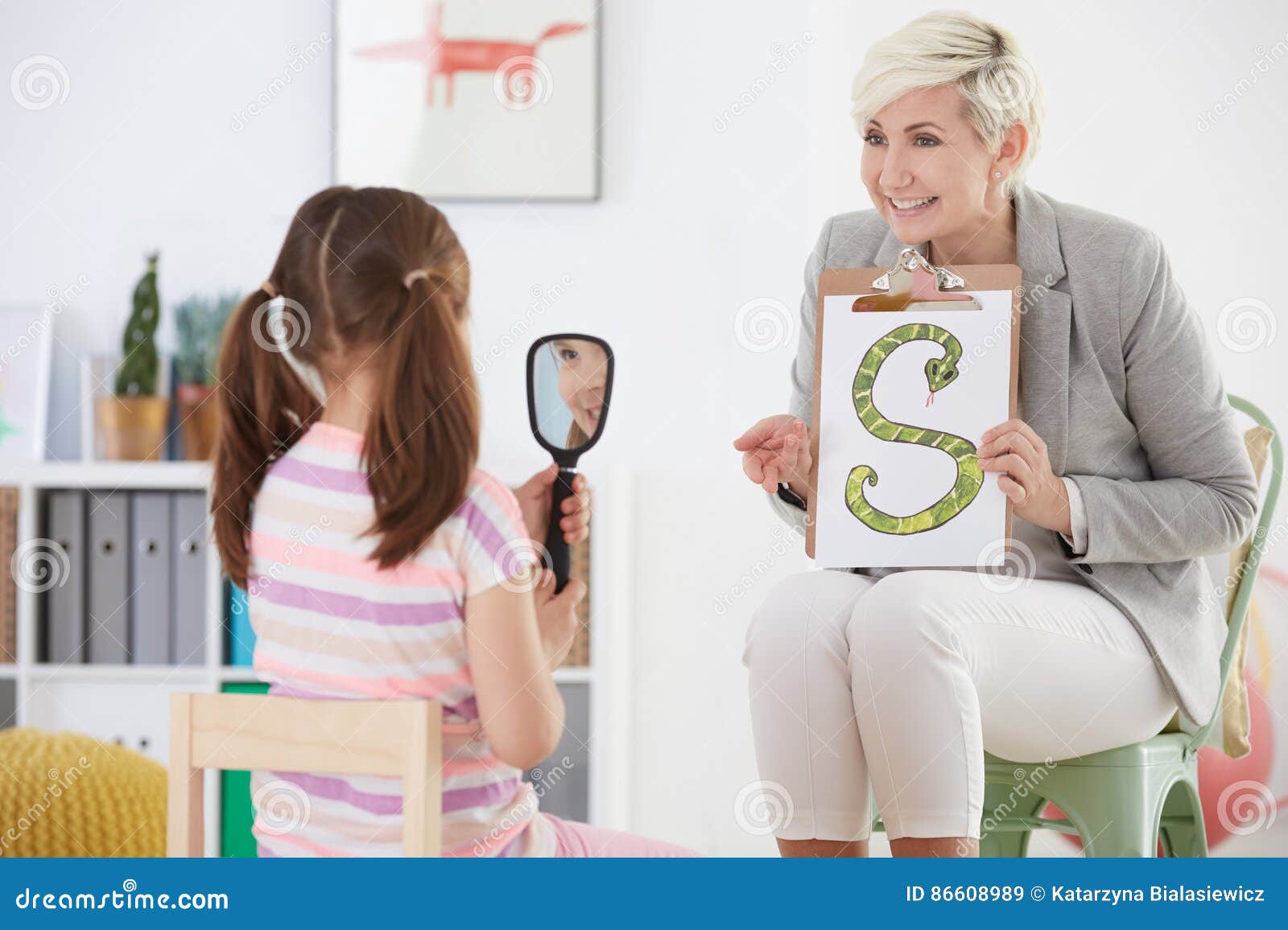 Speech Therapist and Girl Holding Mirror Stock Image - Image of ...