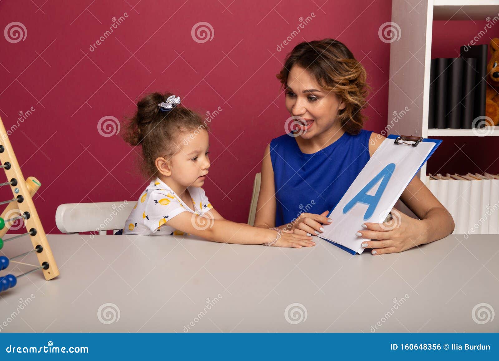 Speech Therapy Concept. Kid with Therapist Learning Letters Together ...
