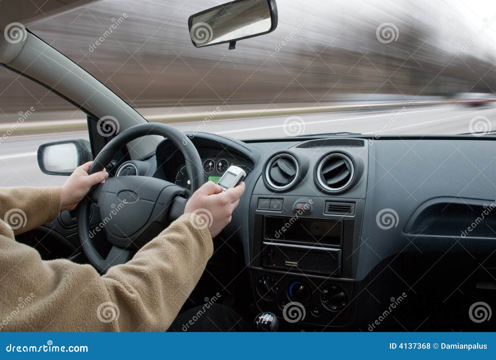Driver Using Cell Phone in Car Blurred Motion Stock Photo - Image of ...