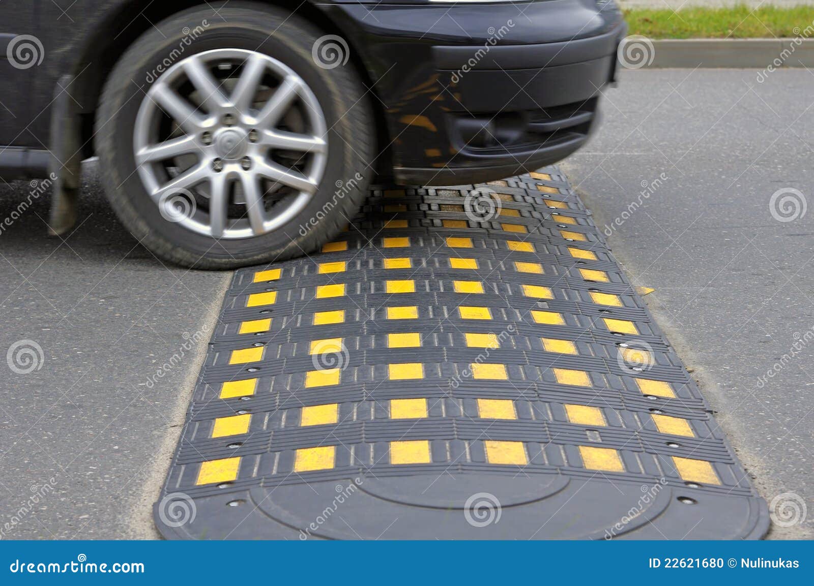 Speed bump on a road stock photo. Image of pass, jump - 22621680